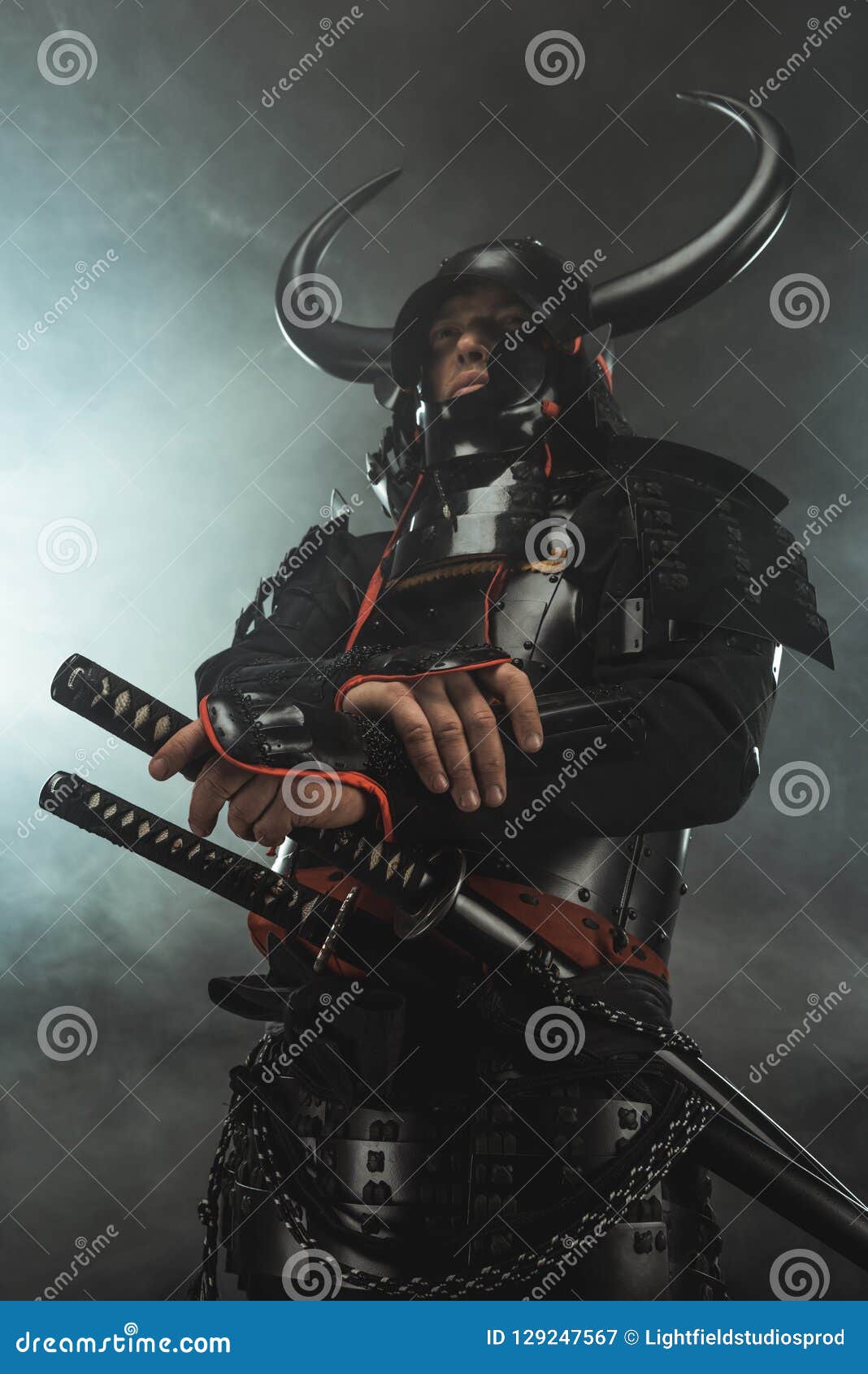 Bottom View of Samurai in Traditional Armor with Swords on Dark ...