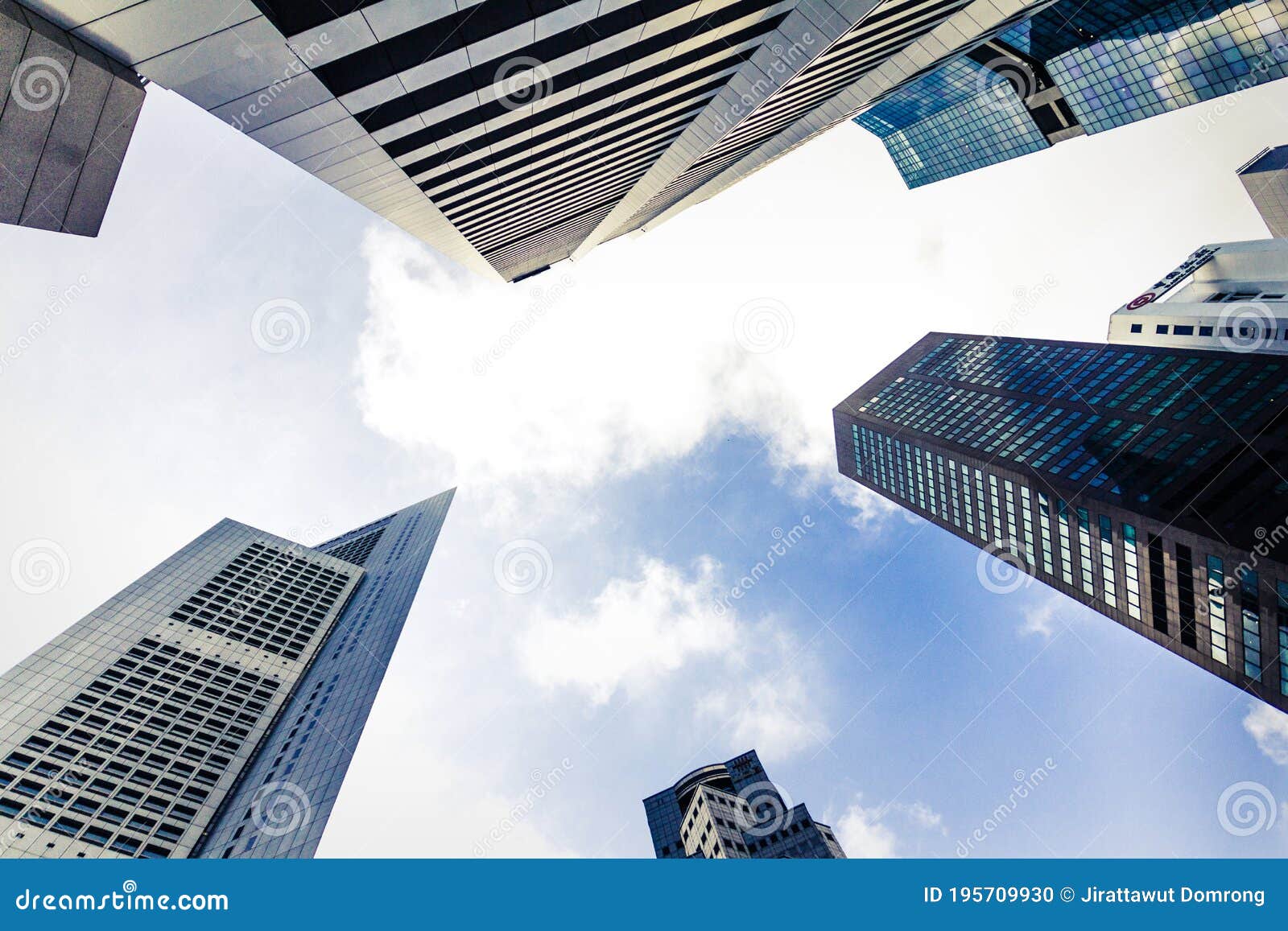 Bottom View of Skyscraper and Blue Sky Background Stock Photo - Image ...