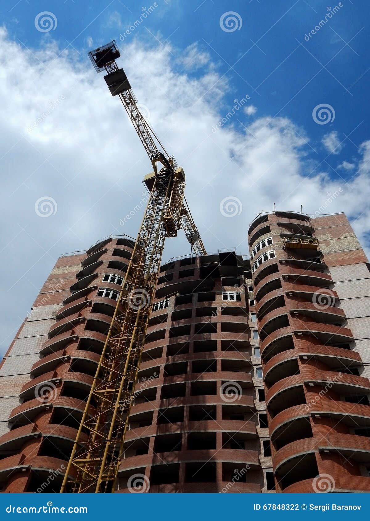 Bottom View on Tower Crane on Building Construction at Works Stock ...