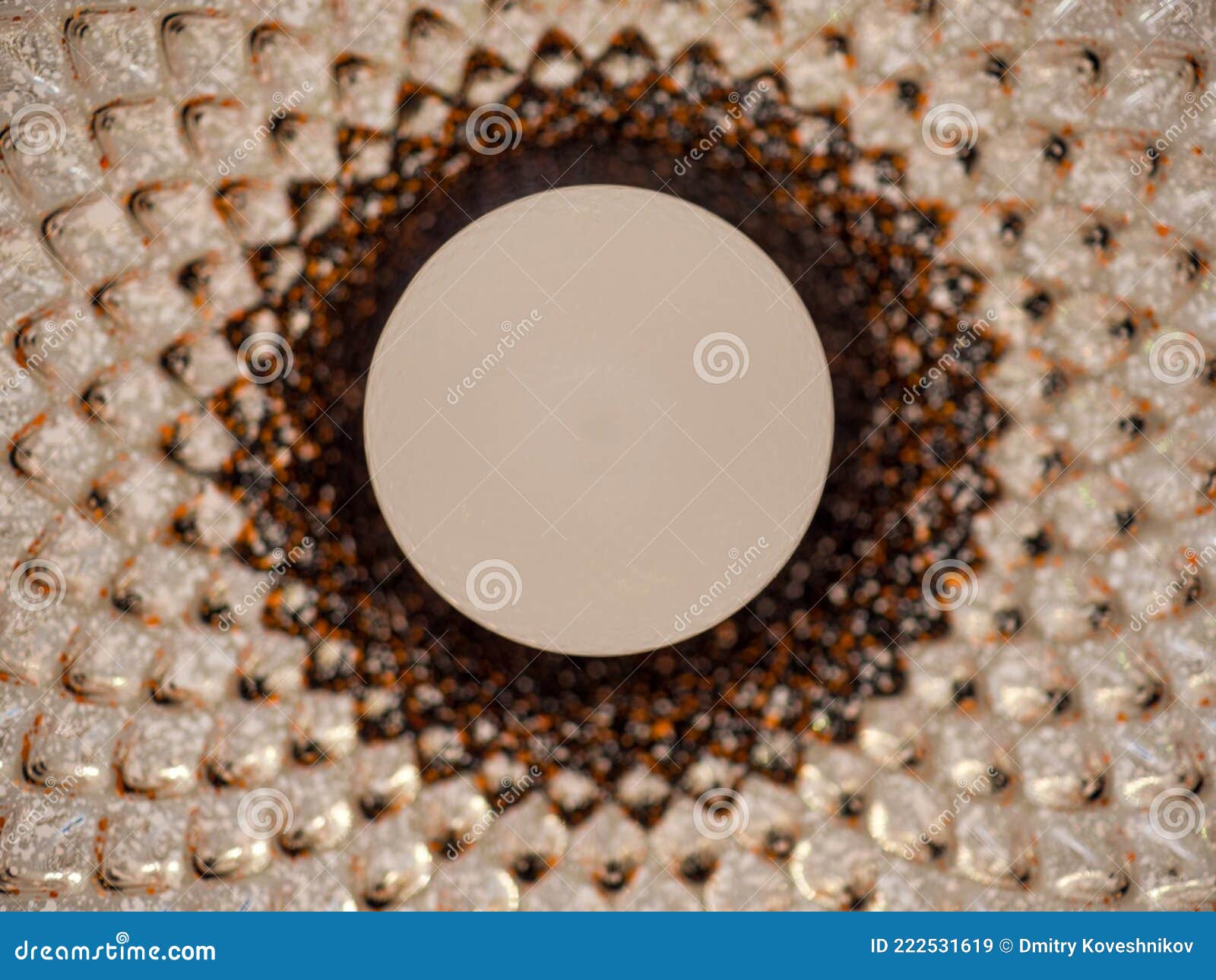 Bottom View of a White Light Bulb Inside the Ceiling with an Abstract ...
