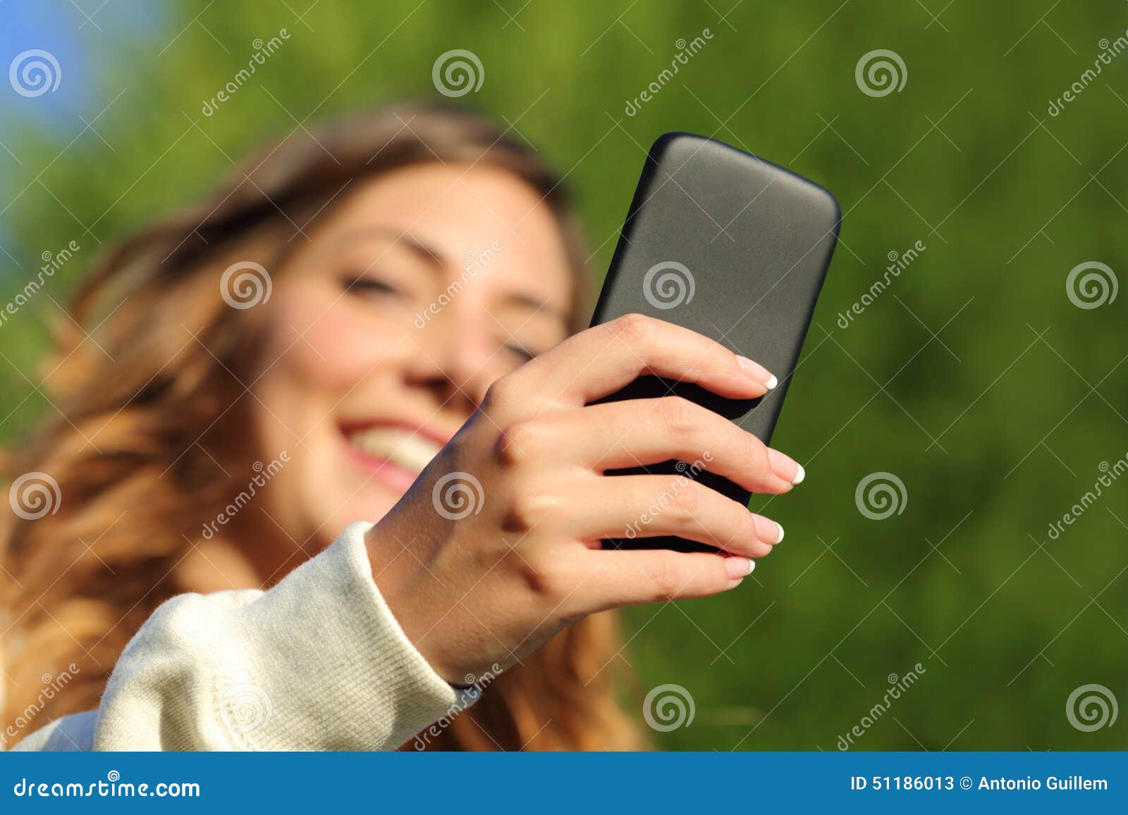 Bottom View of a Woman Hand Texting on a Smart Phone Stock Image ...