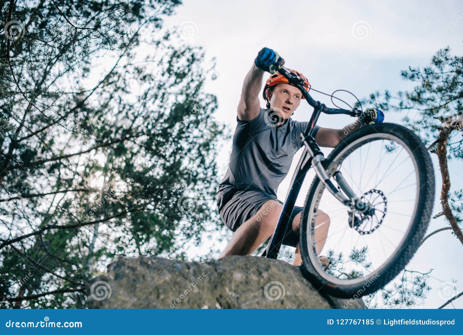 Bottom View of Young Trial Biker Standing Stock Image - Image of ...