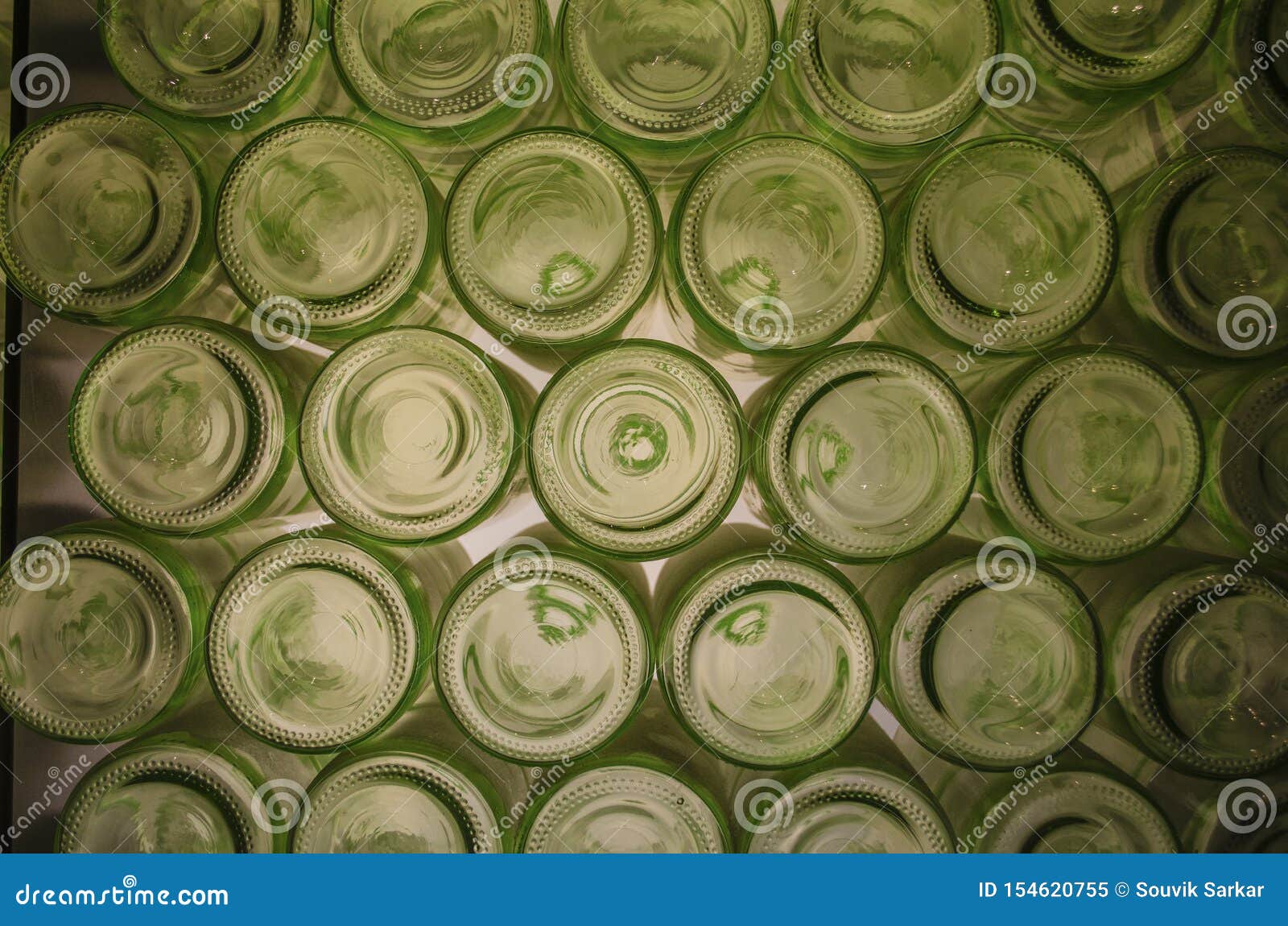 Bottom of Wine Alcohol Bottle Kept in a Row in a Industrial Production ...