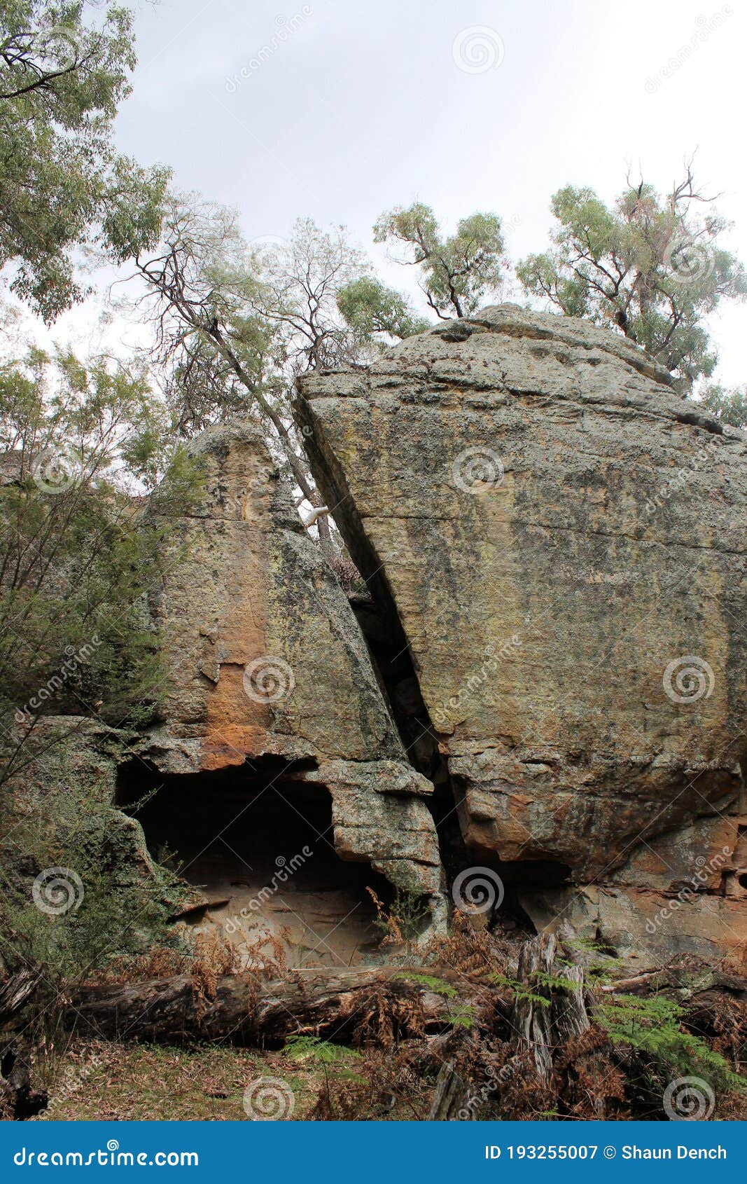 Boulder with a Large Crack on a Cliff Stock Image - Image of geological ...