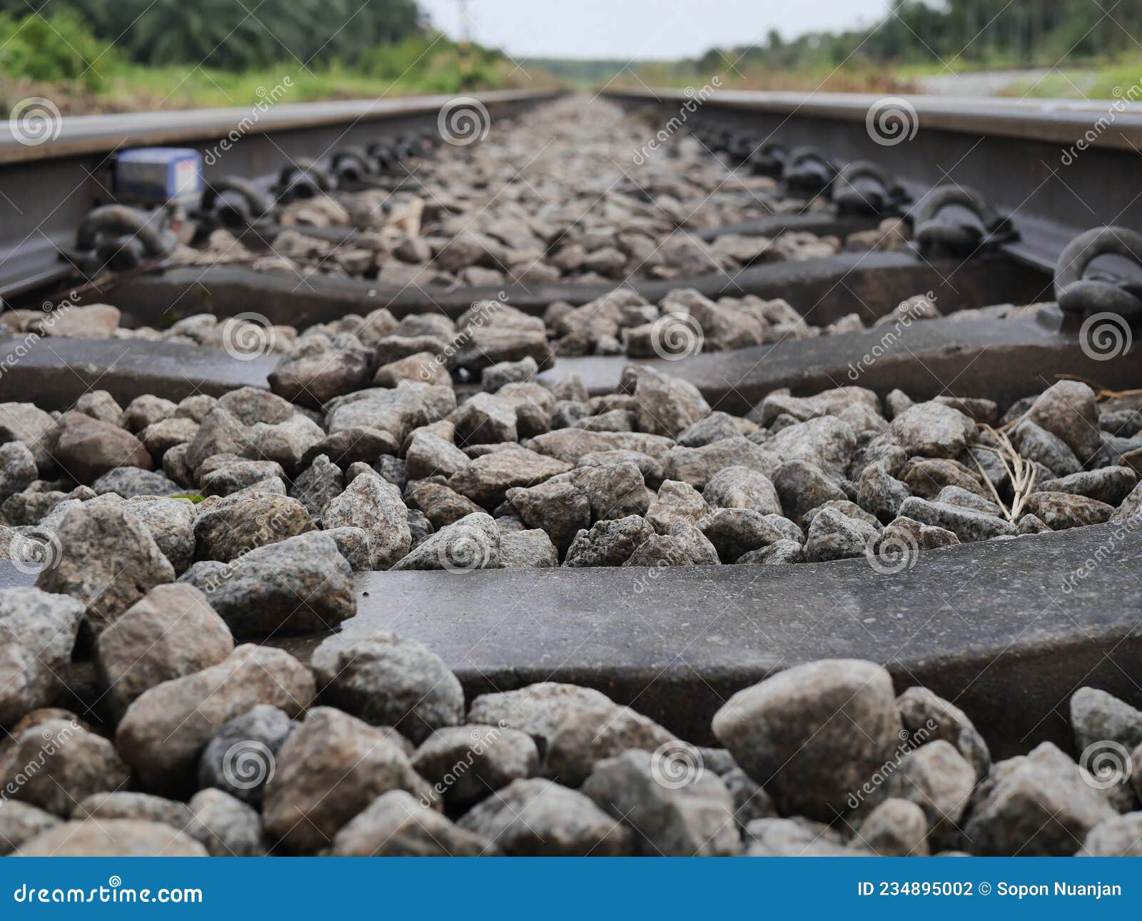 Boulder between Railroad Tracks Stock Photo - Image of line, rock ...