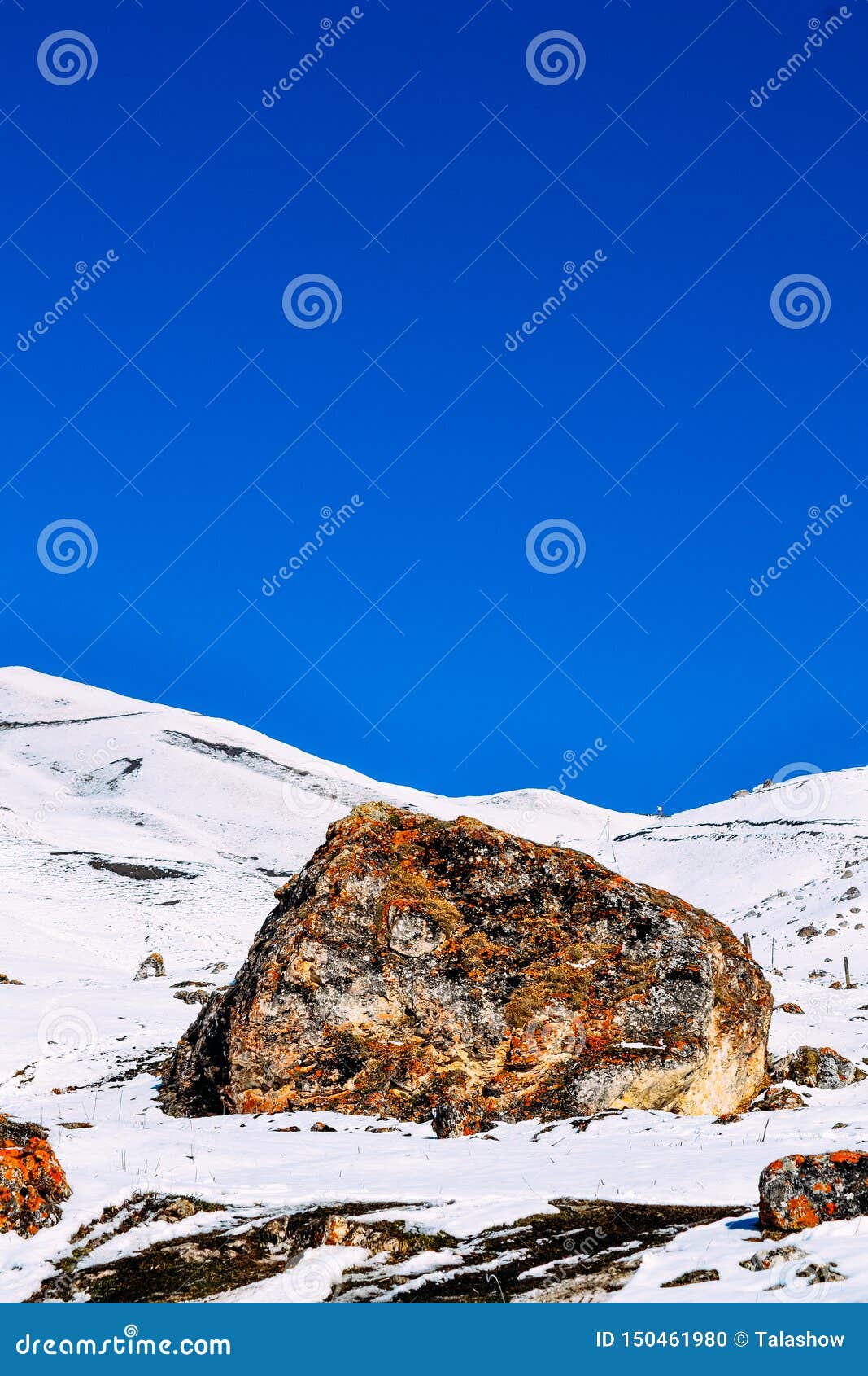 Boulder on a Snowy Mountain in the Daytime Stock Photo - Image of snowy ...