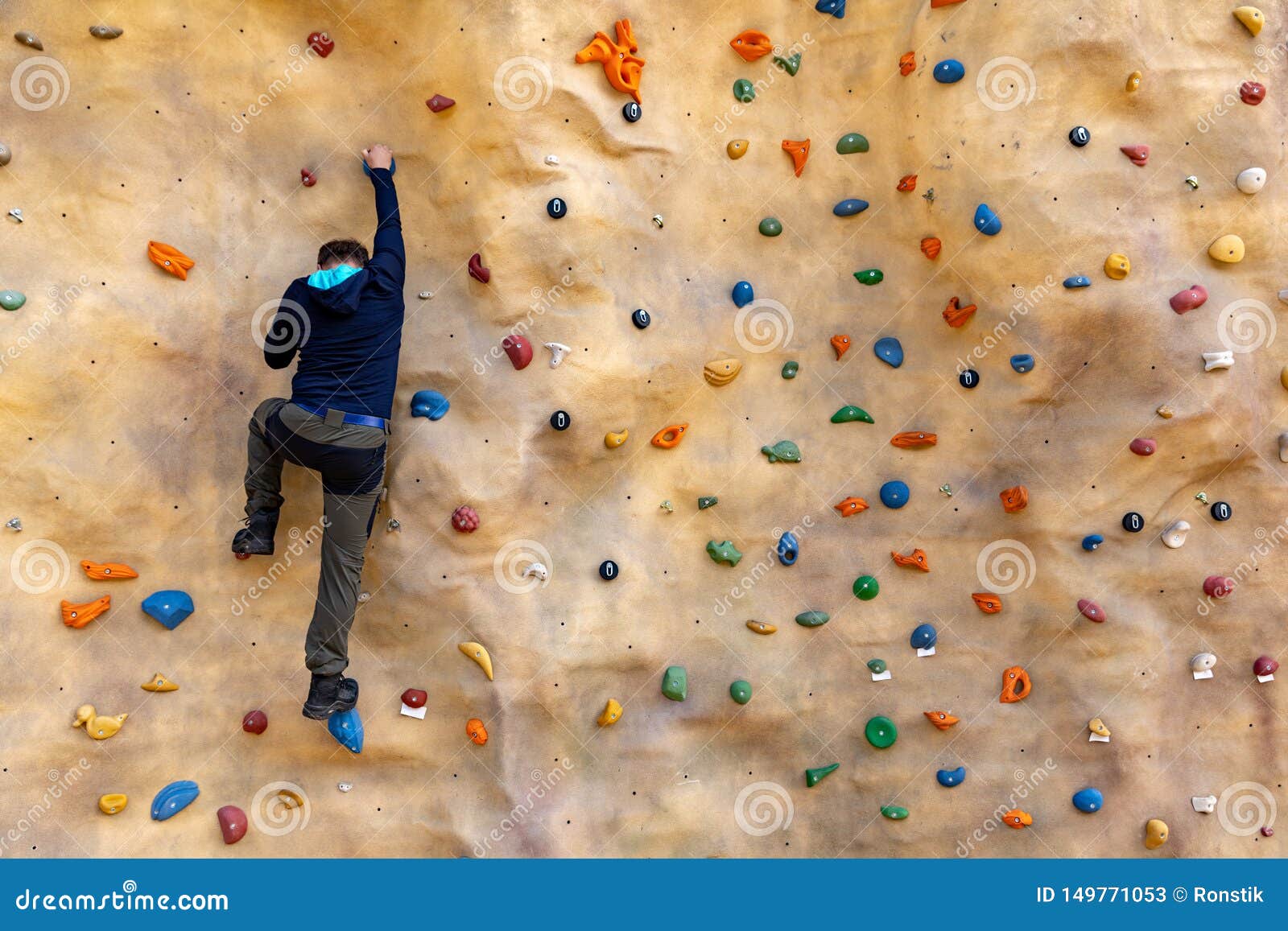 Bouldering - Man Climbing on Artificial Rock Wall Stock Image - Image ...