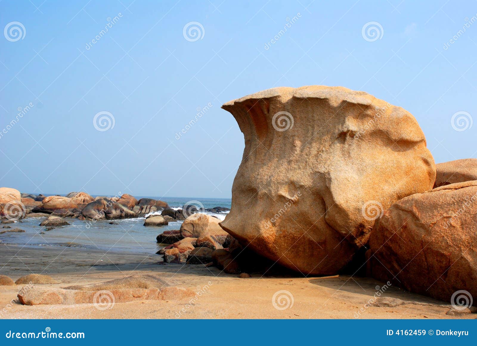 Boulders on the beach stock image. Image of tourism, formations - 4162459