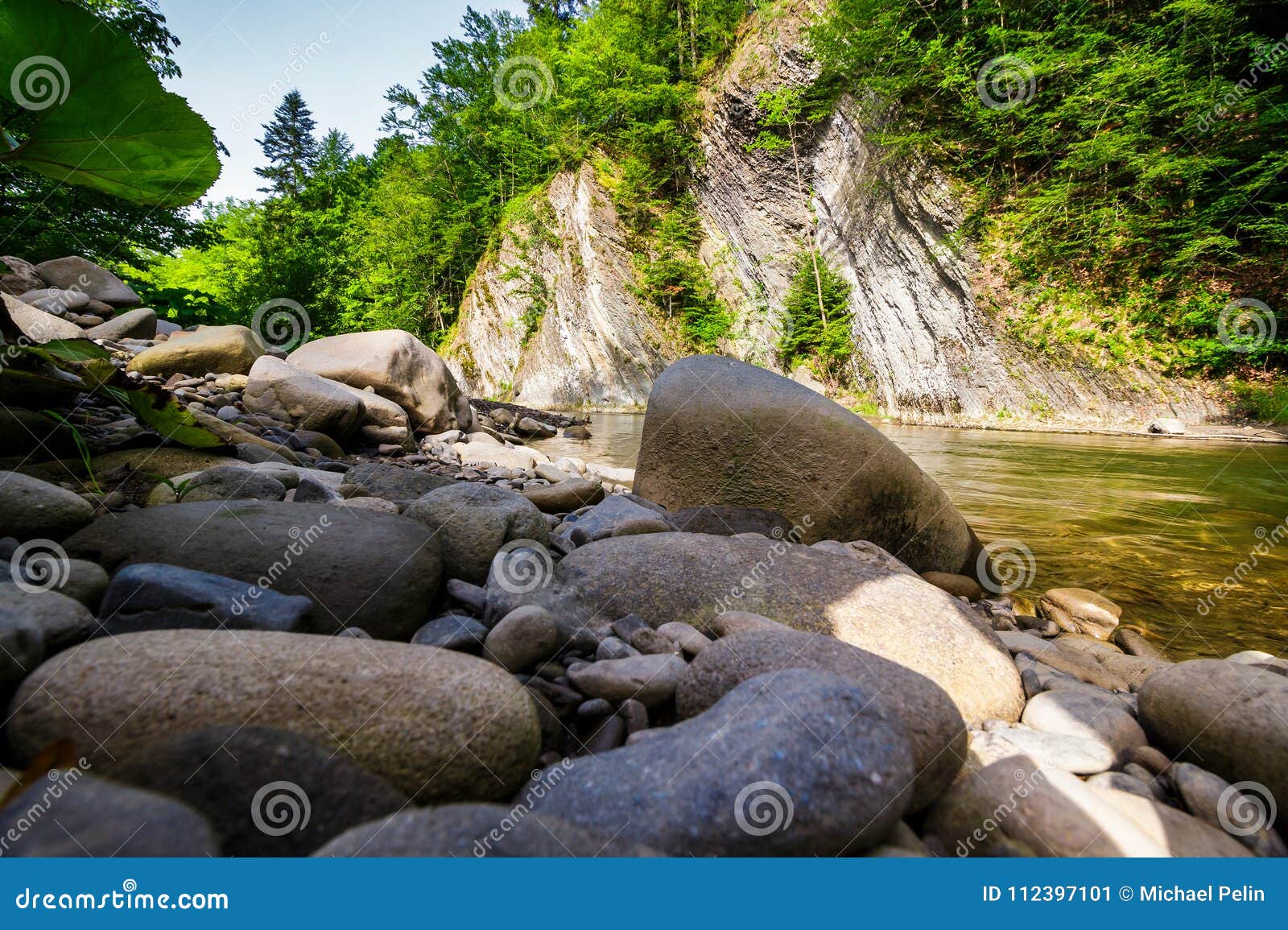 Boulders on the Shore of the River Stock Image - Image of shore, rocky ...