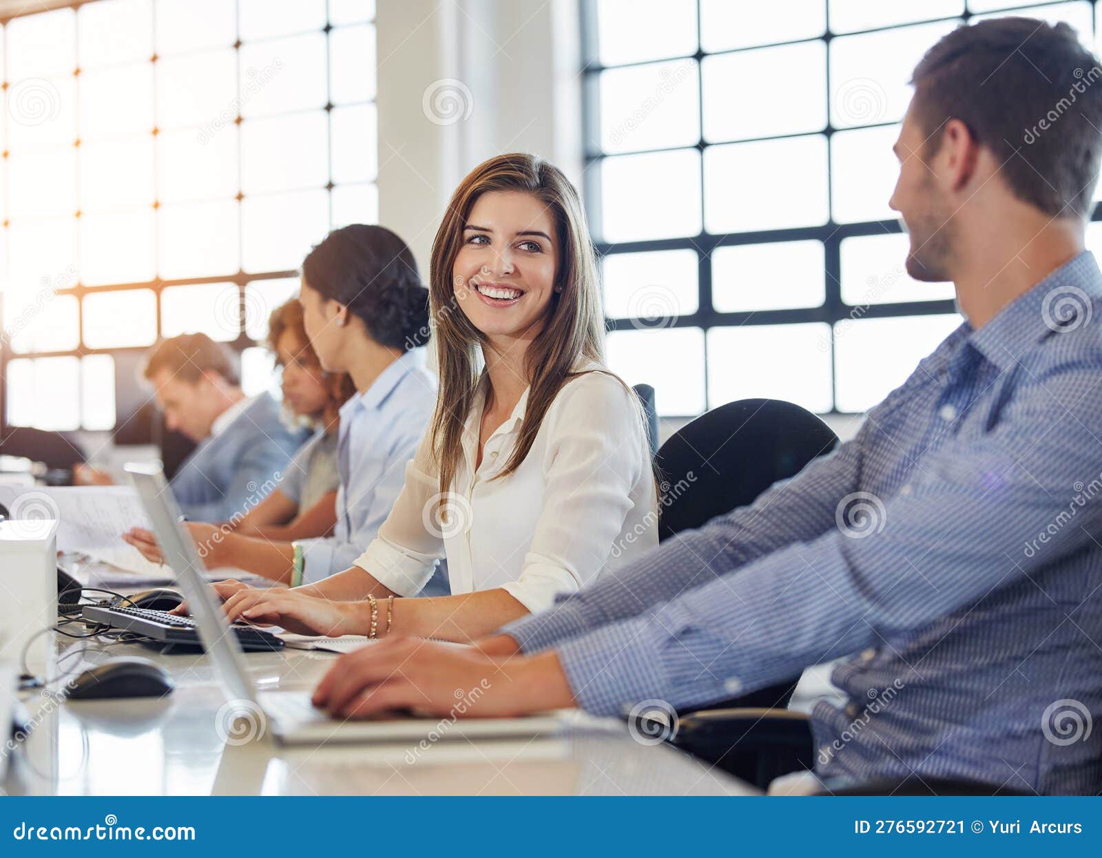 Bouncing Ideas Off of One Another. a Group of Businesspeople Working in ...