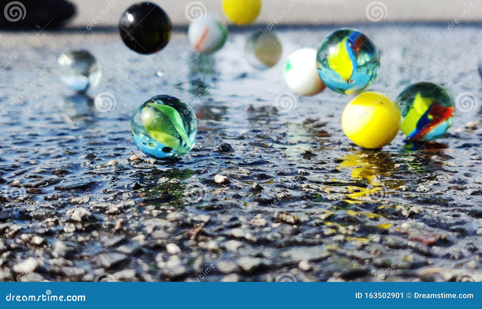 Bouncing marbles stock image. Image of bouncing, texture - 163502901