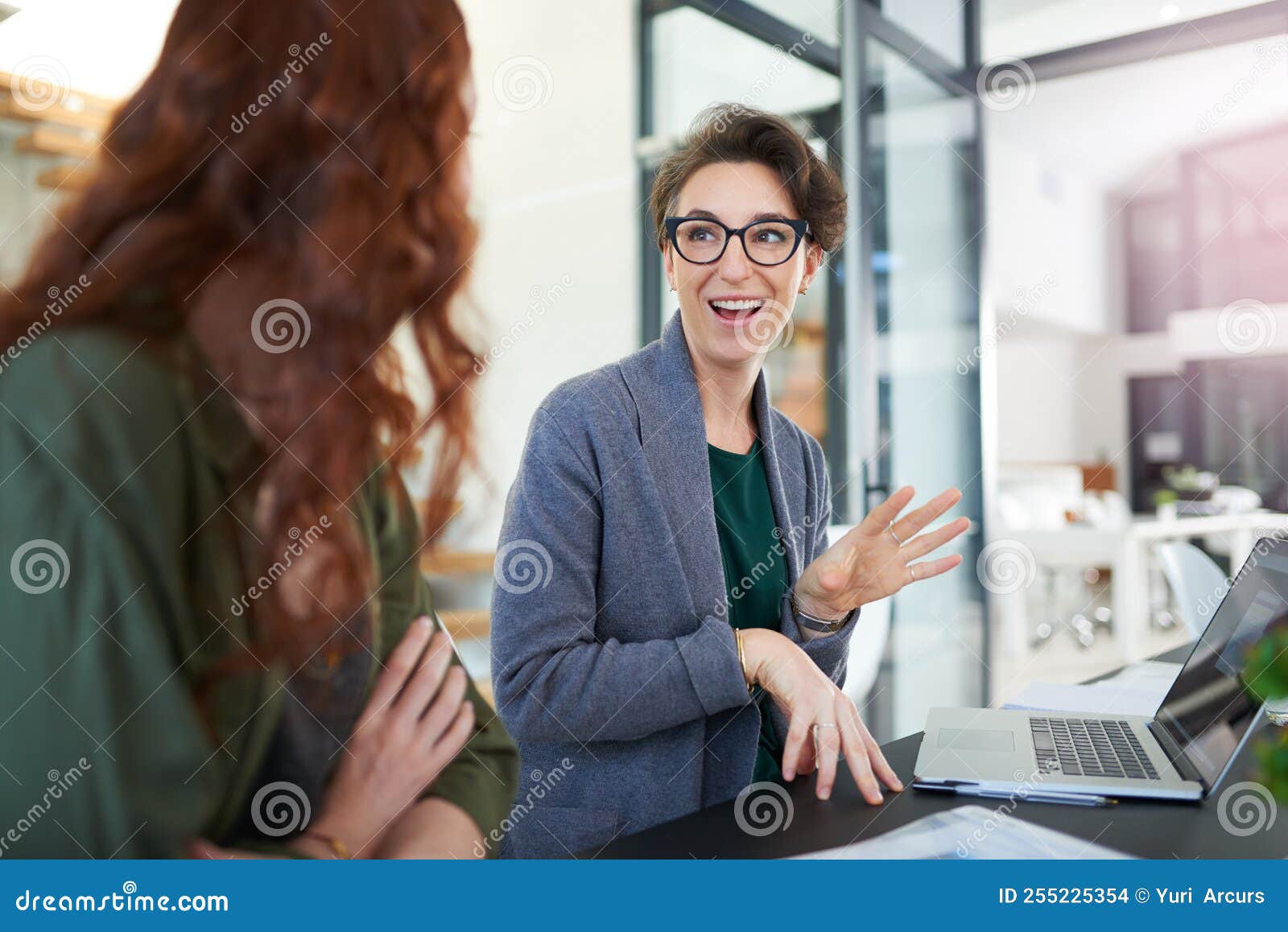 Bouncing Some Fresh Ideas Off Each Other. Two Young Creatives Working ...