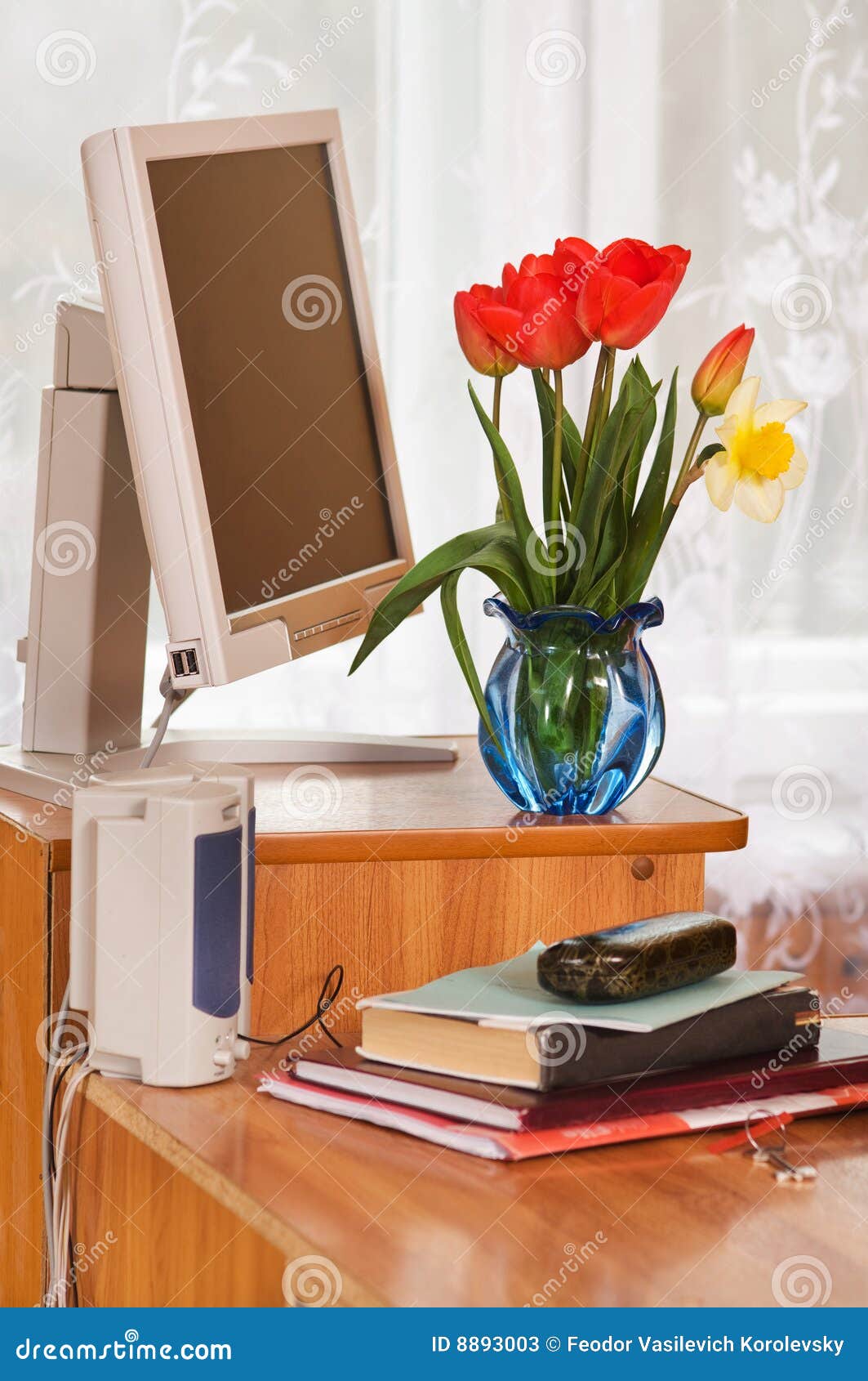 Bouquet and the computer. stock image. Image of table - 8893003