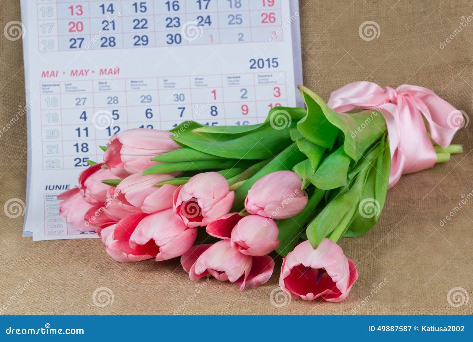 A Bouquet of Pink Tulips Lying on the Calendar Stock Image - Image of ...