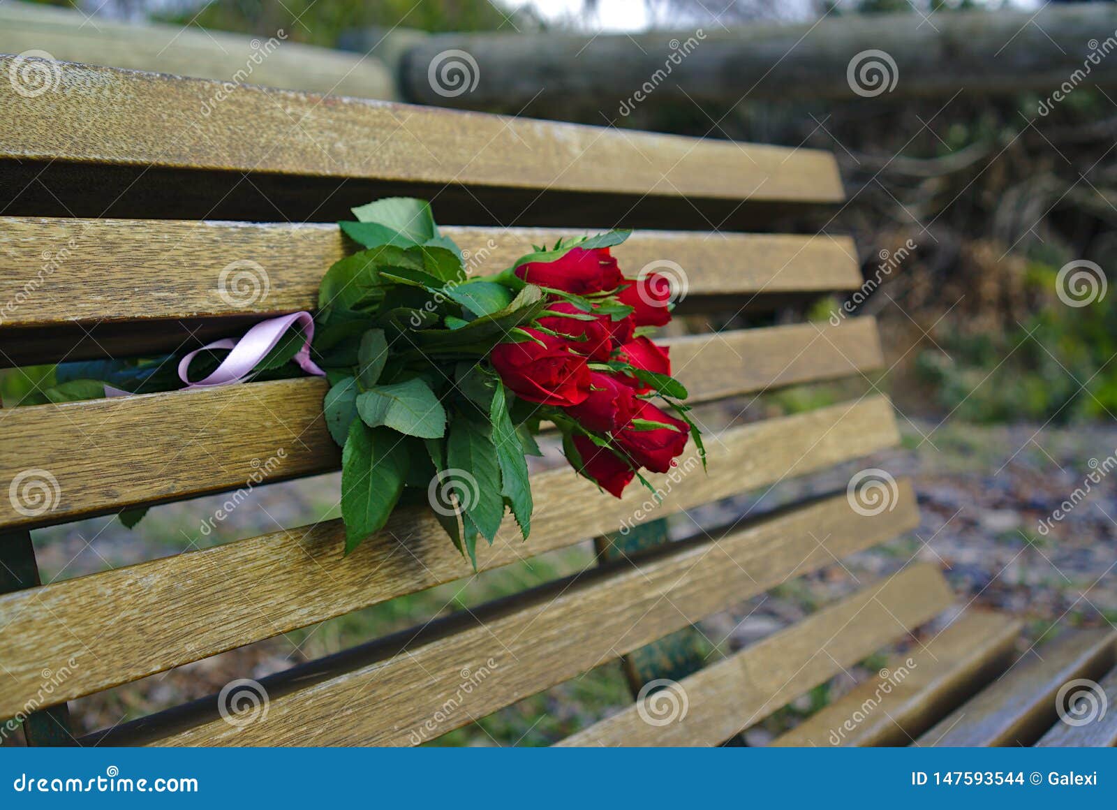 Bouquet of Red Roses on Bench Stock Photo - Image of romance, wedding ...