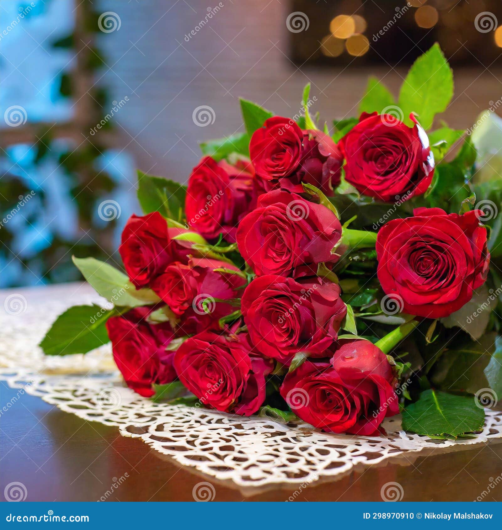 A Bouquet of Red Roses Lying on the Table. Stock Photo - Image of ...