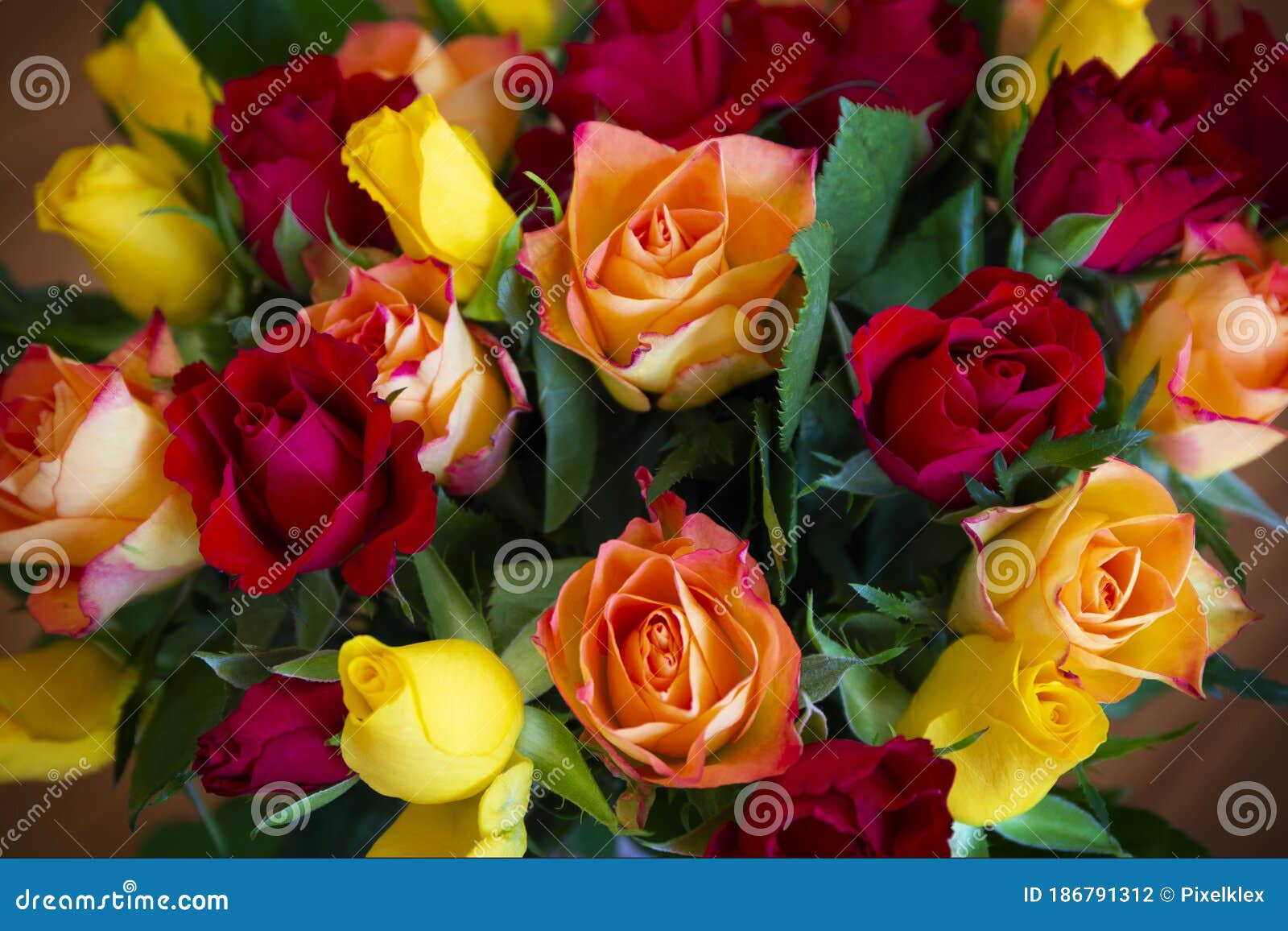 Bouquet of Roses Made of Red, Yellow and Orange Roses Stock Photo ...