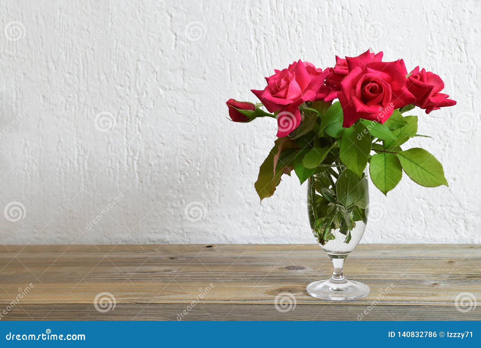Bouquet of roses in a vase stock photo. Image of holiday - 140832786