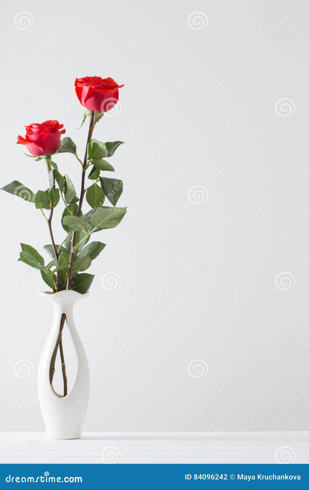 Bouquet of roses in vase stock photo. Image of composition - 84096242