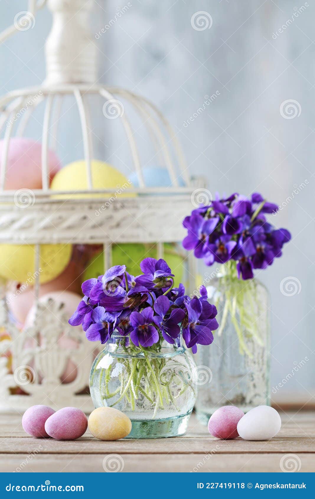 Bouquet of Tiny Violets Viola Odorata and Chocolate Easter Eggs on ...
