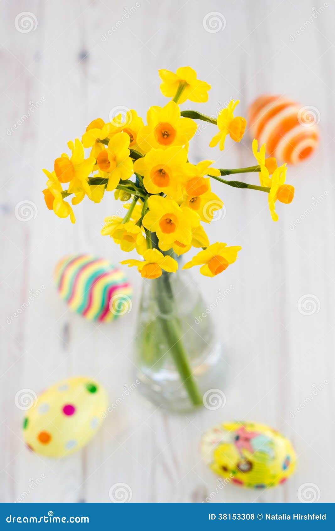 Bouquet of Yellow Lent Lilly (daffodil) with Easter Eggs on a Wooden ...