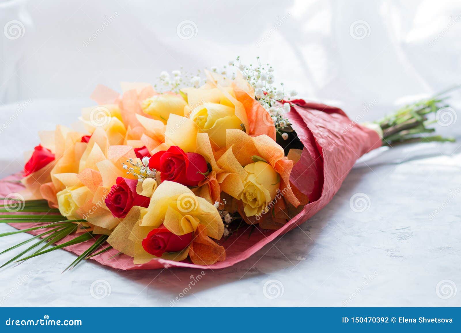 Bouquet of Yellow and Red Roses on a White Surface. Stock Photo - Image ...