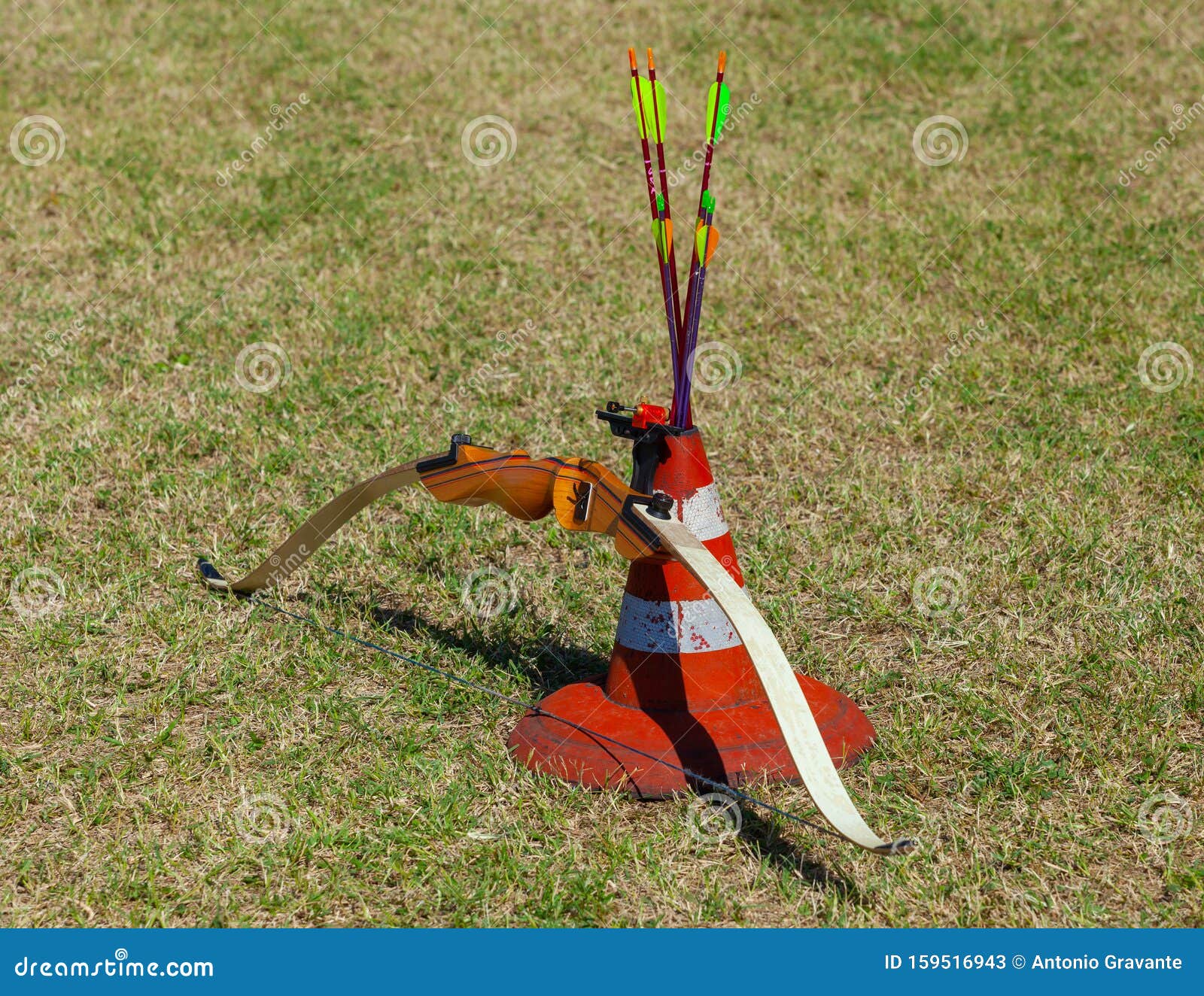 Bow and arrow in a cone stock image. Image of hobby - 159516943