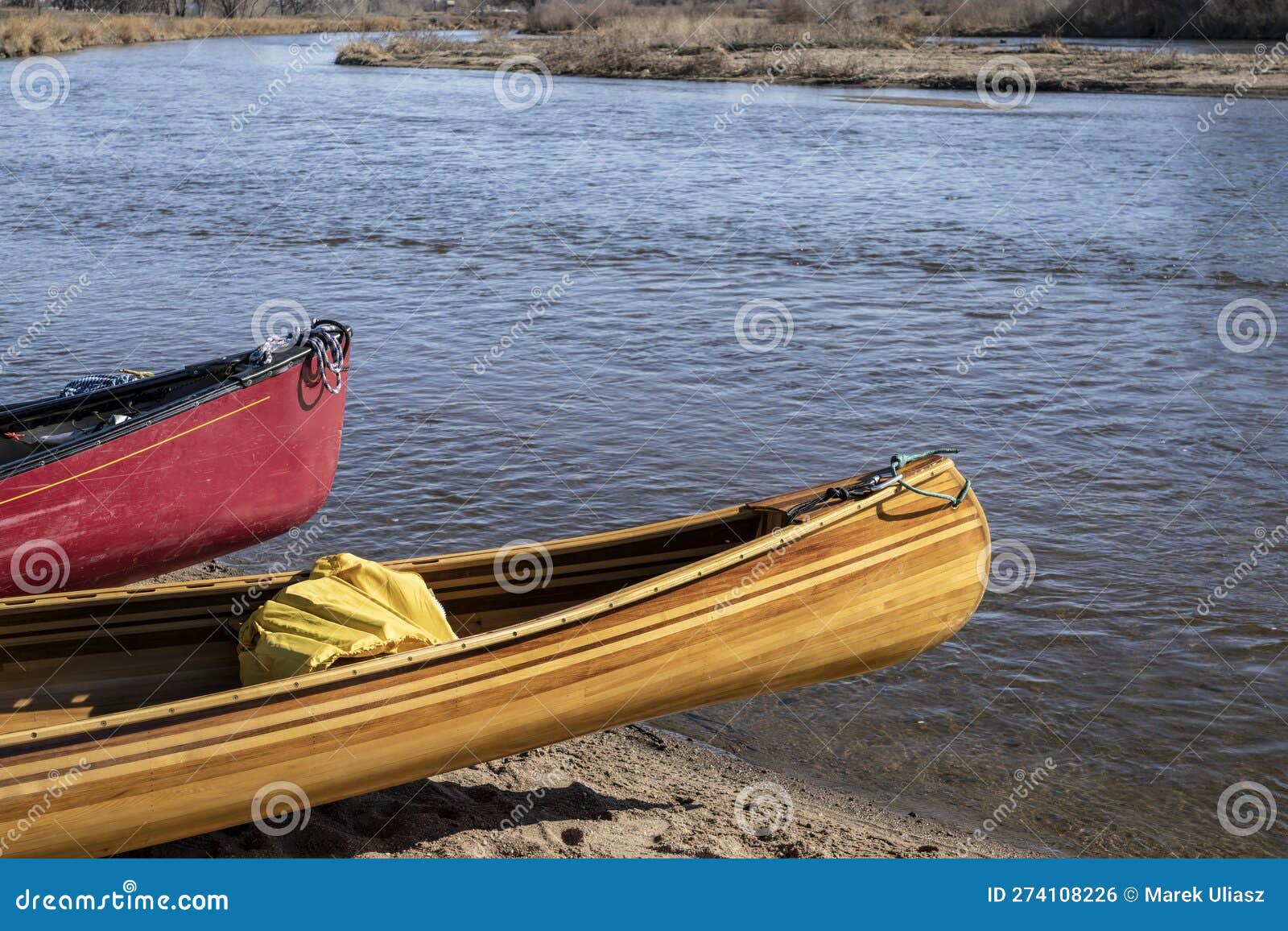 Bow of Beautiful, Home Built, Wooden Canoe on a River Shore Stock Photo ...