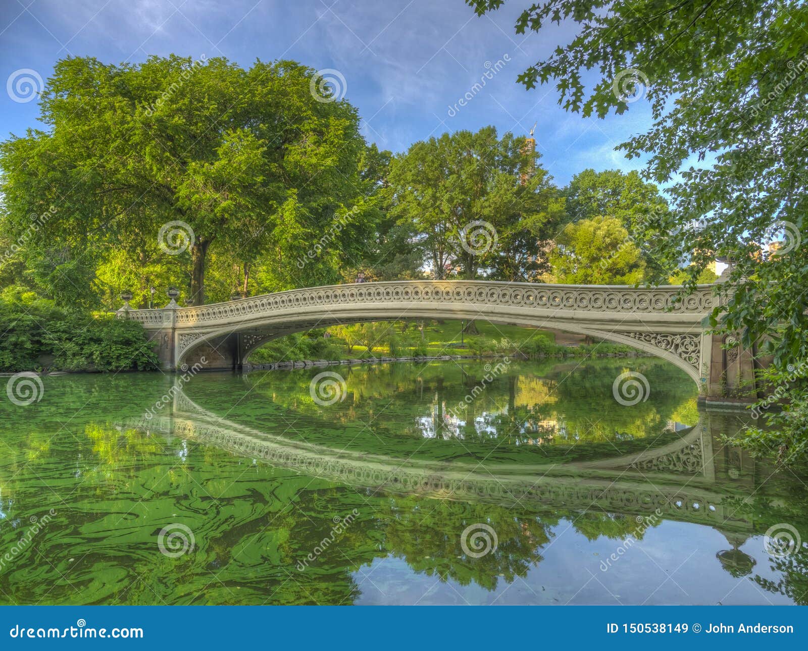 Bow bridge in spring stock image. Image of central, flowers - 150538149