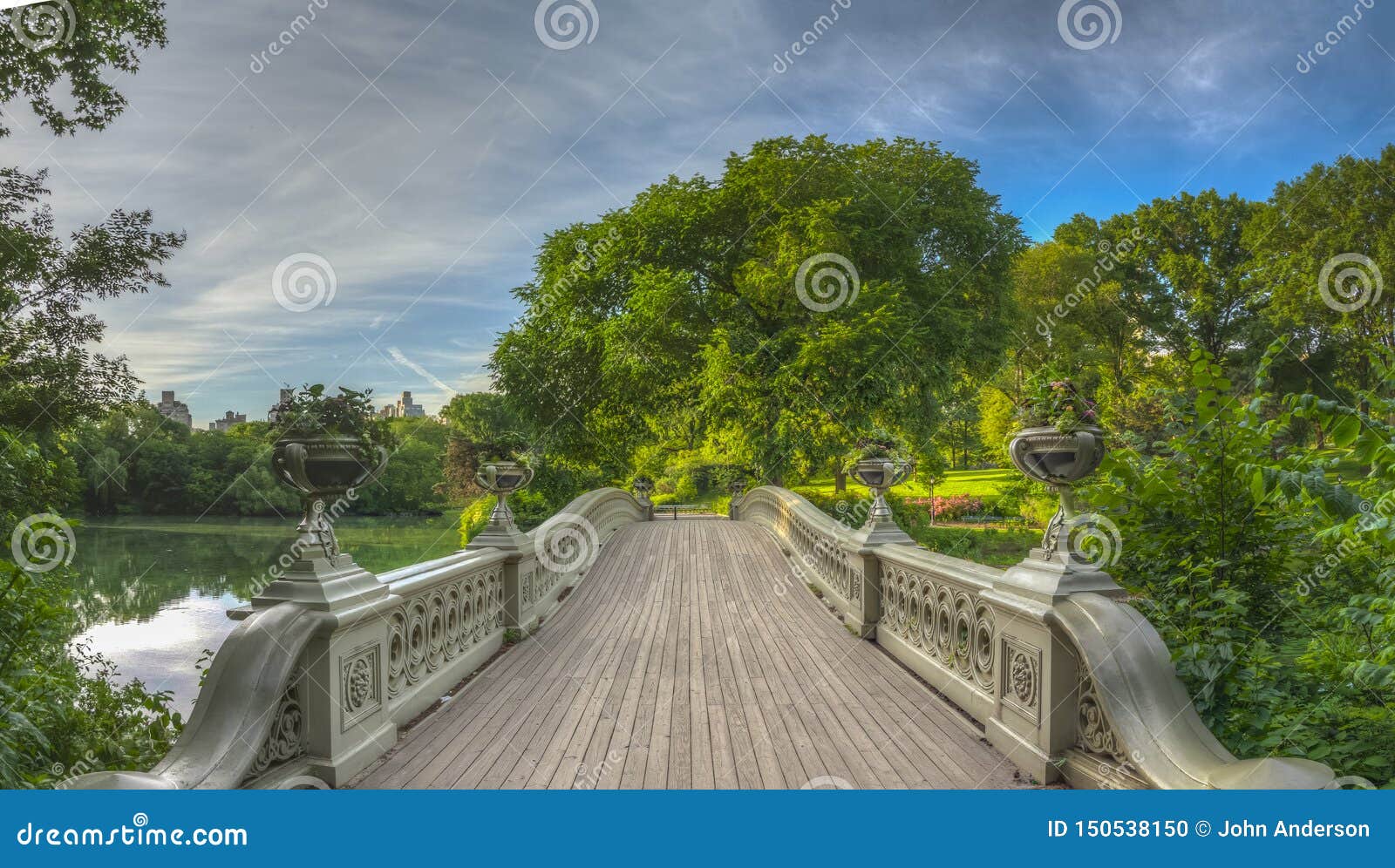 Bow bridge in spring stock photo. Image of park, trees - 150538150