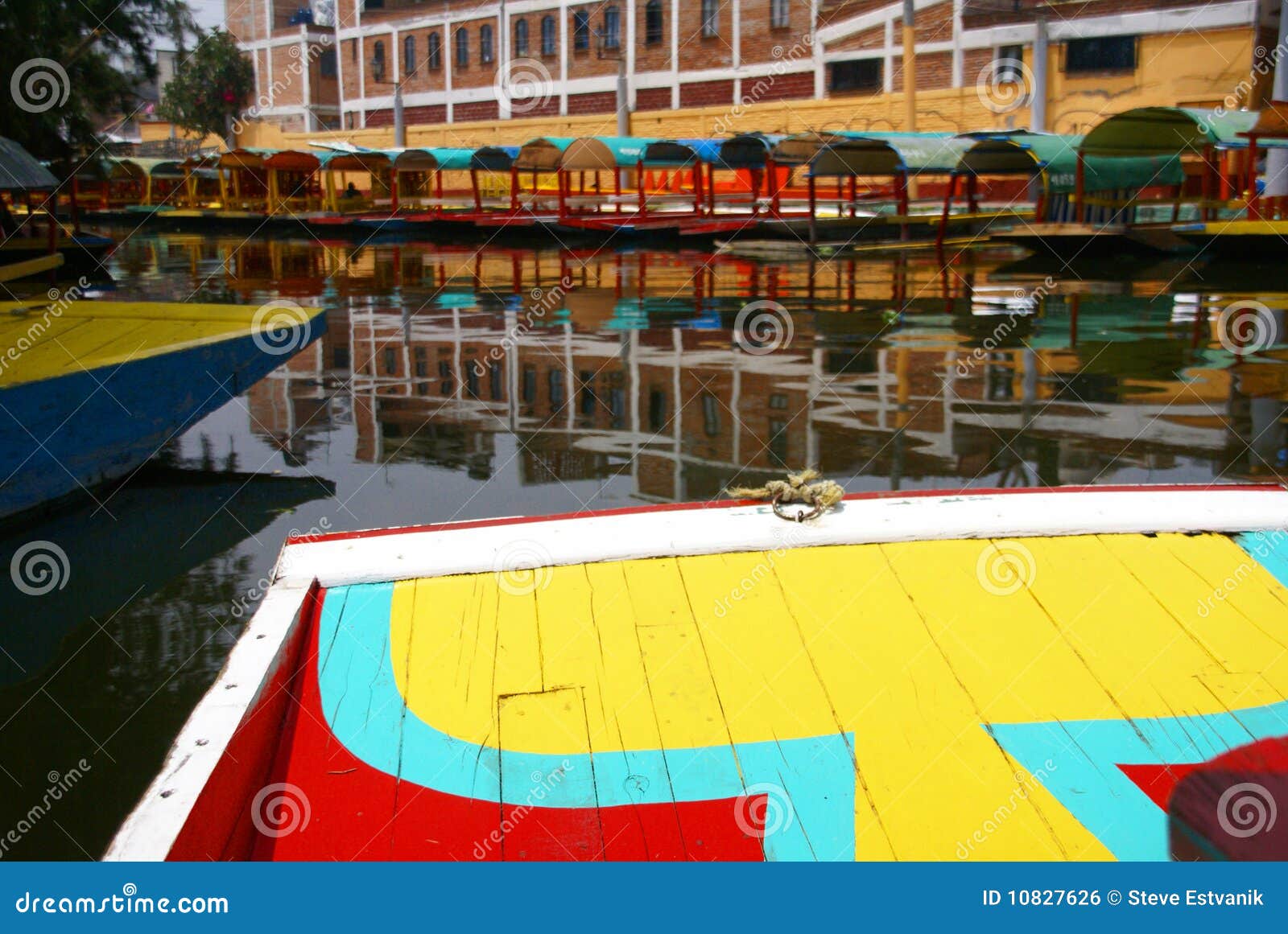 Bow of Brightly Colored Boat Stock Photo - Image of floating, yellow ...