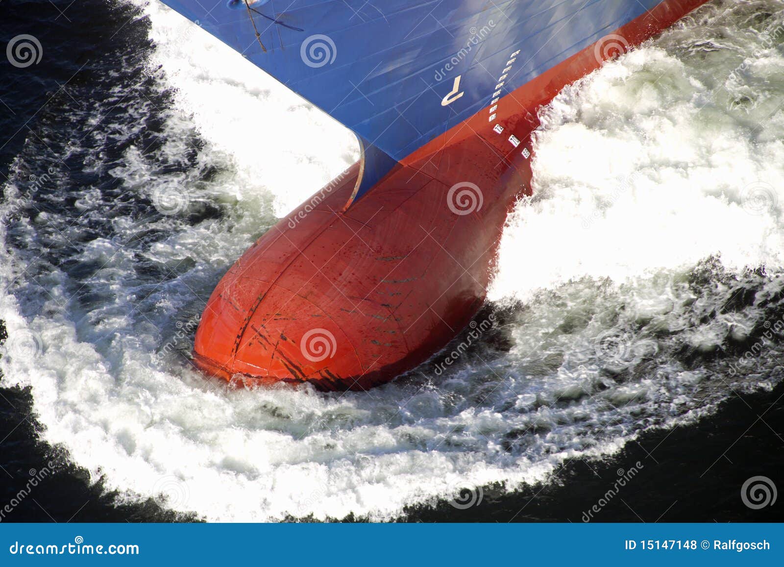 Container Vessel Berthing At An Industrial Port. Tugboat Push Large ...