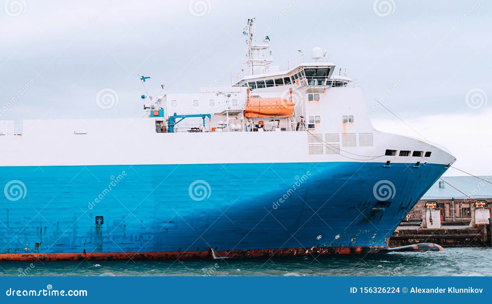 Bow of Ro-Ro Vessel Side View. Blue and White Ship Stay in Port. Stock ...