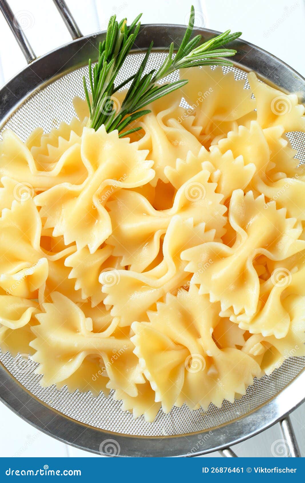 Bow tie pasta in a sieve stock image. Image of closeup - 26876461