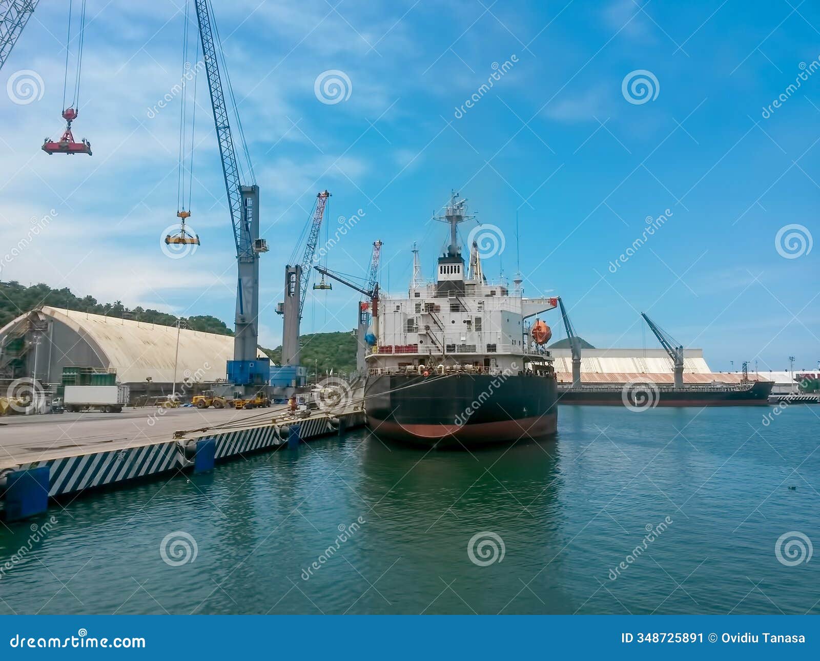 Bow View of Loaded Cargo Ship Sailing Out of Big Port Stock Image ...