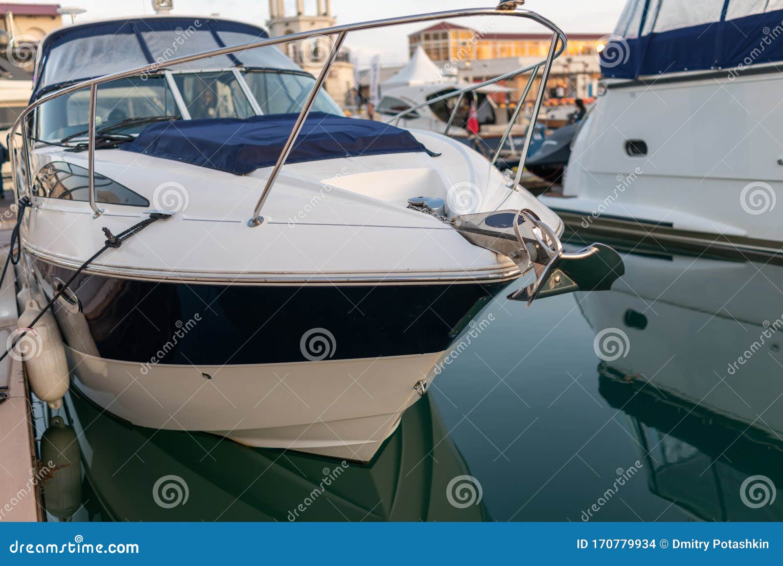The Bow of a Yacht with a Shiny Anchor on the Pier Stock Photo - Image ...