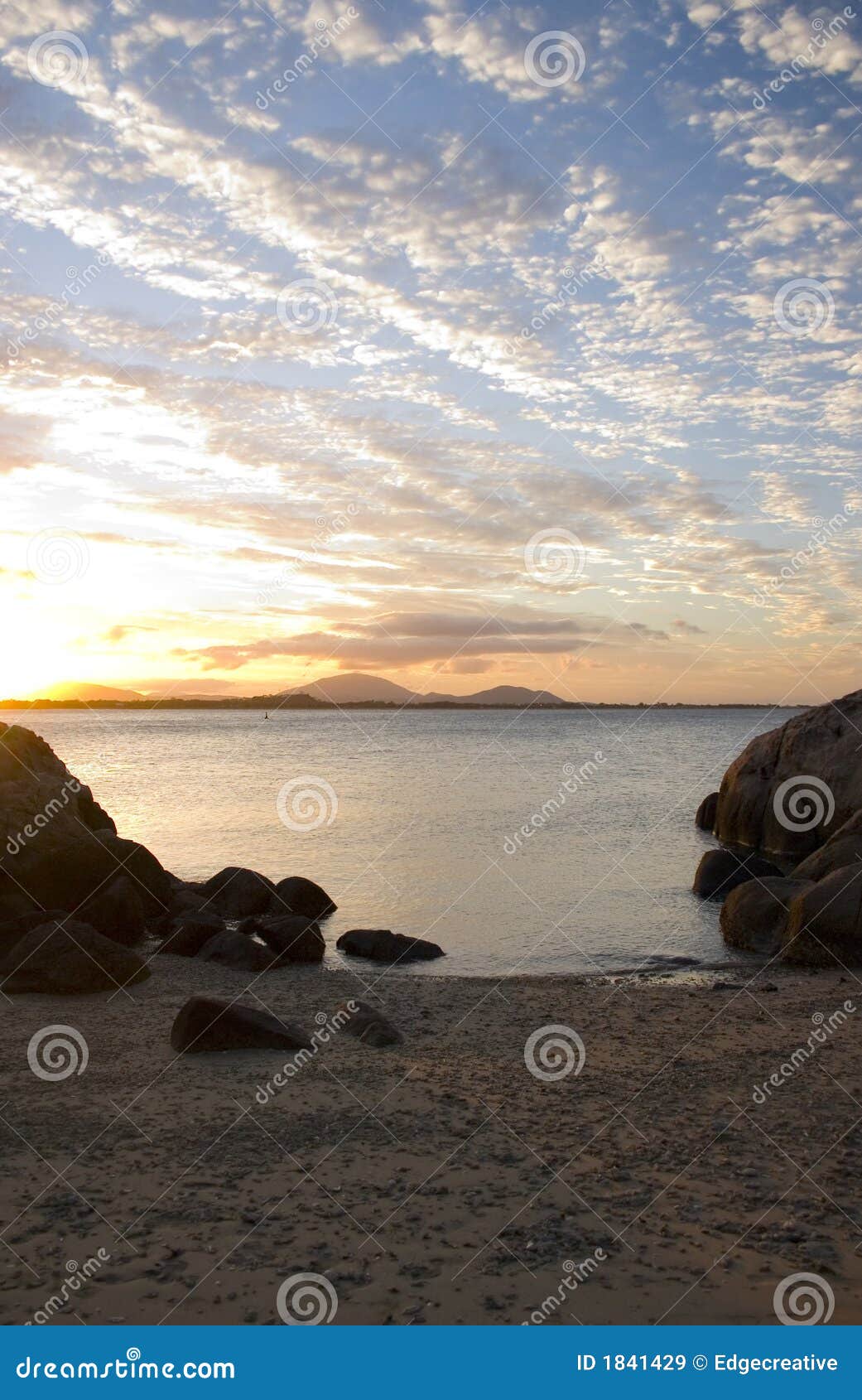 Bowen sunset stock image. Image of ocean, sand, clouds - 1841429