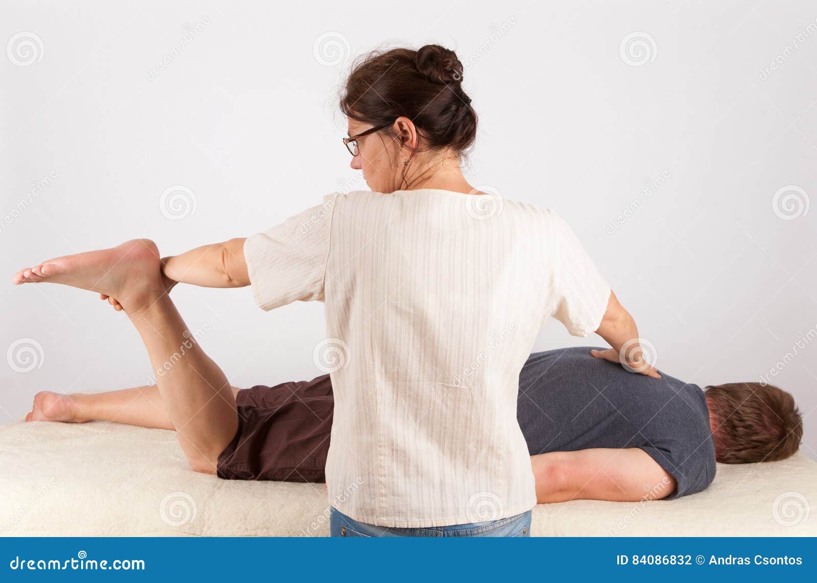 Bowen therapy of a man stock photo. Image of bowen, middleaged - 84086832