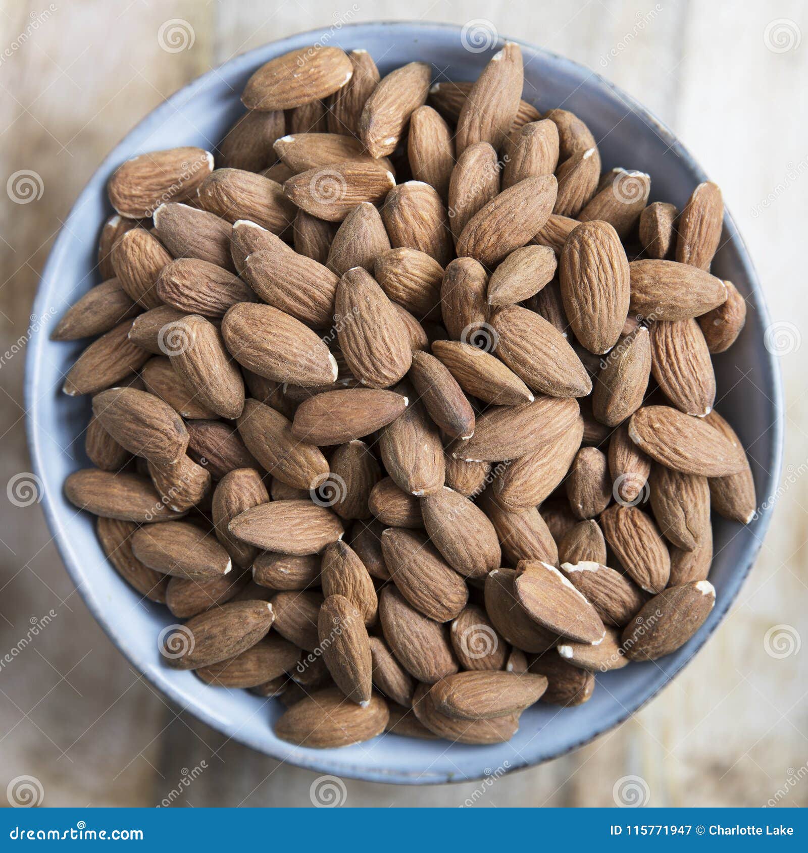 Bowl of Almonds stock image. Image of heap, brown, seed - 115771947