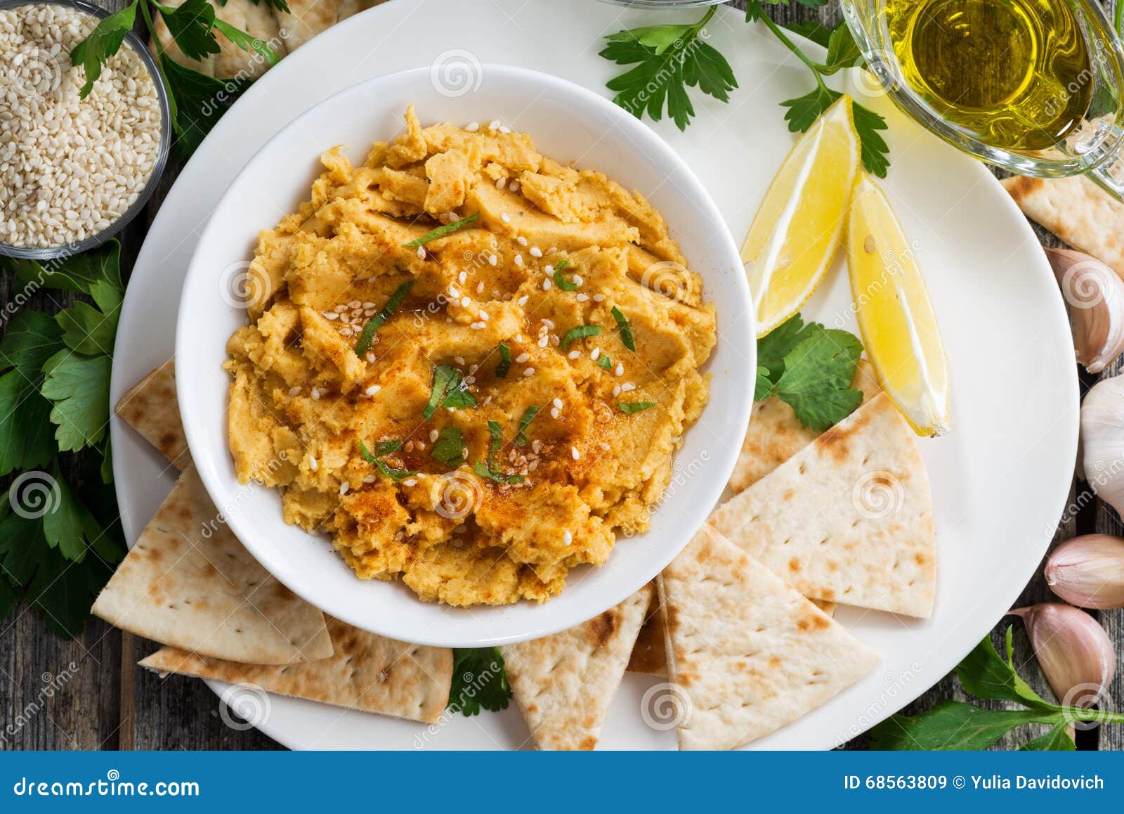 Bowl of Arabic Sauce Hummus with Flatbread, Top View Stock Image ...