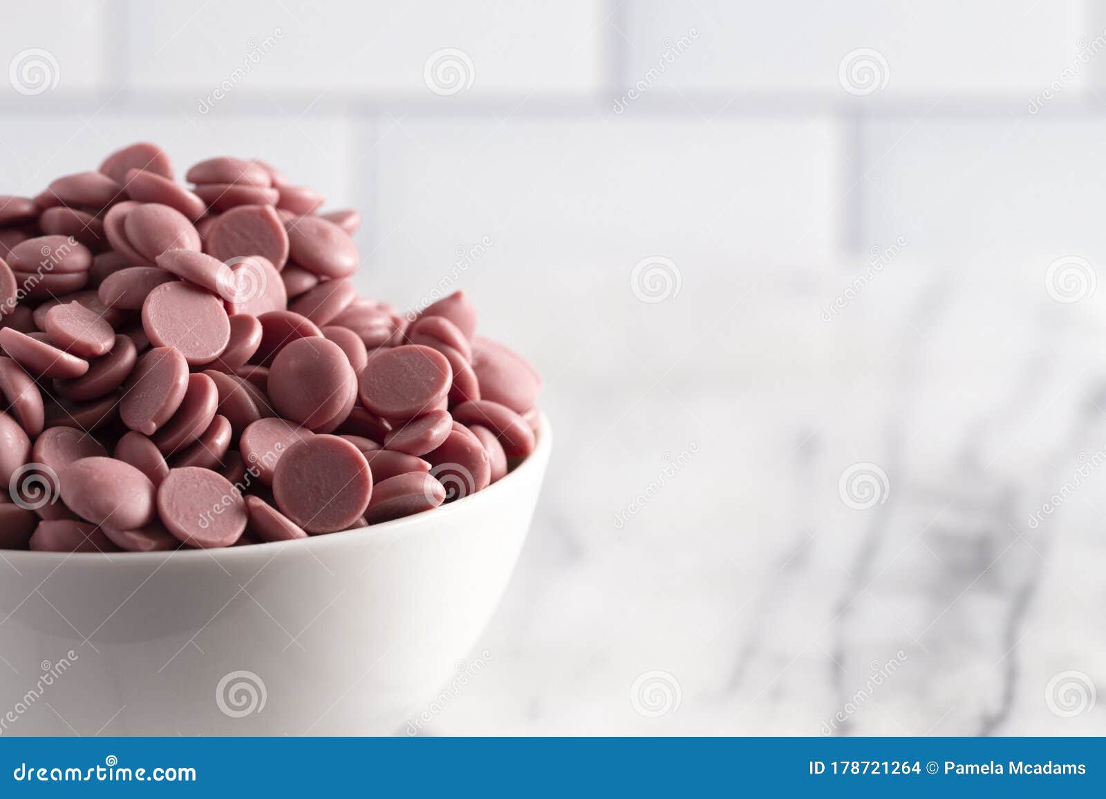Bowl of Authentic Ruby Chocolate Drops on a Marble Counter Stock Photo ...