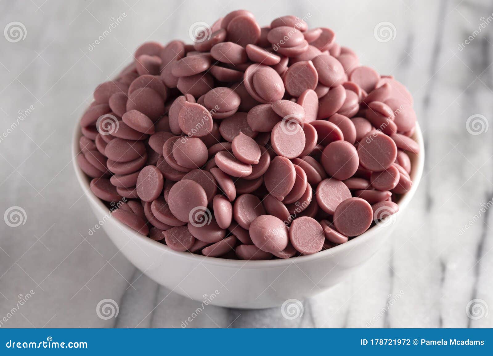 Bowl of Authentic Ruby Chocolate Drops on a Marble Counter Stock Photo ...