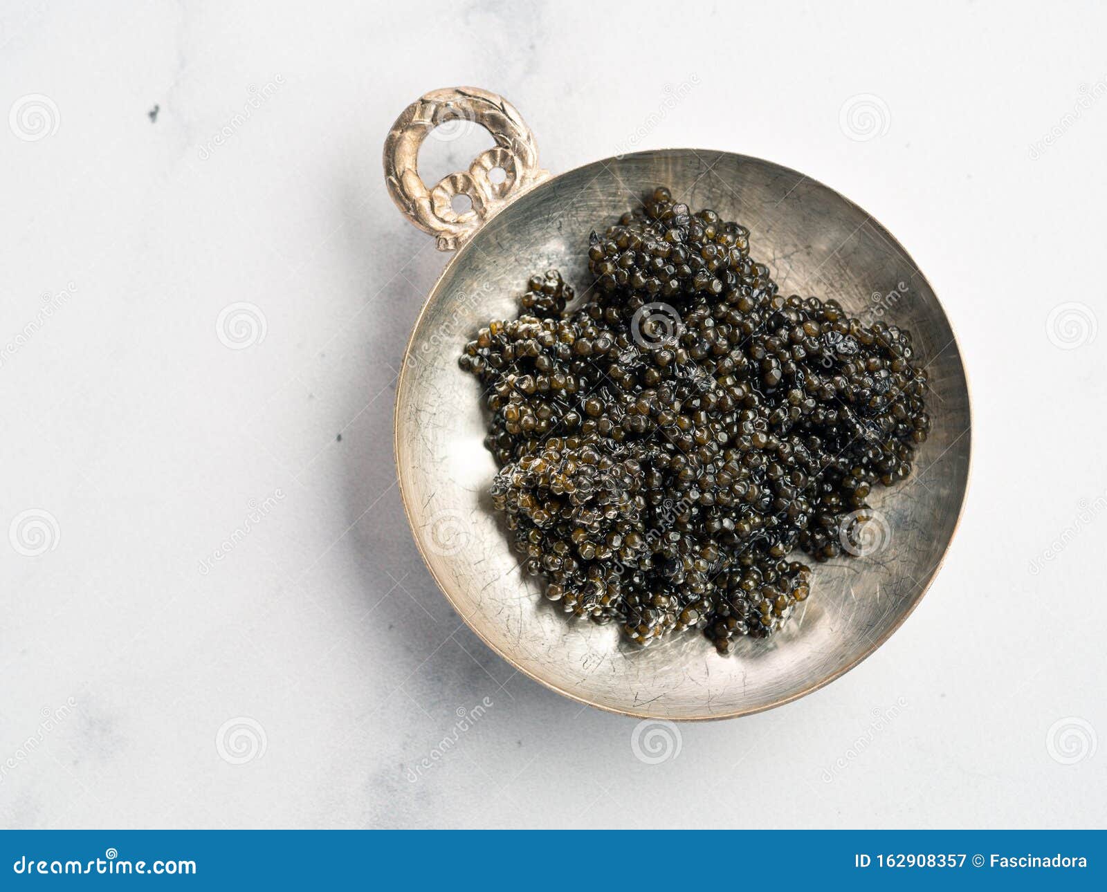 Bowl of Black Caviar on White Marble Stock Image - Image of marble ...