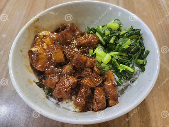 A Bowl of Braised Pork Rice Stock Photo - Image of black, vegetables ...