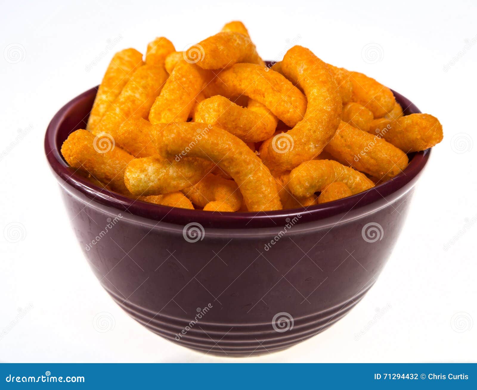 A Bowl of Cheese Puffs stock photo. Image of bowl, calories - 71294432
