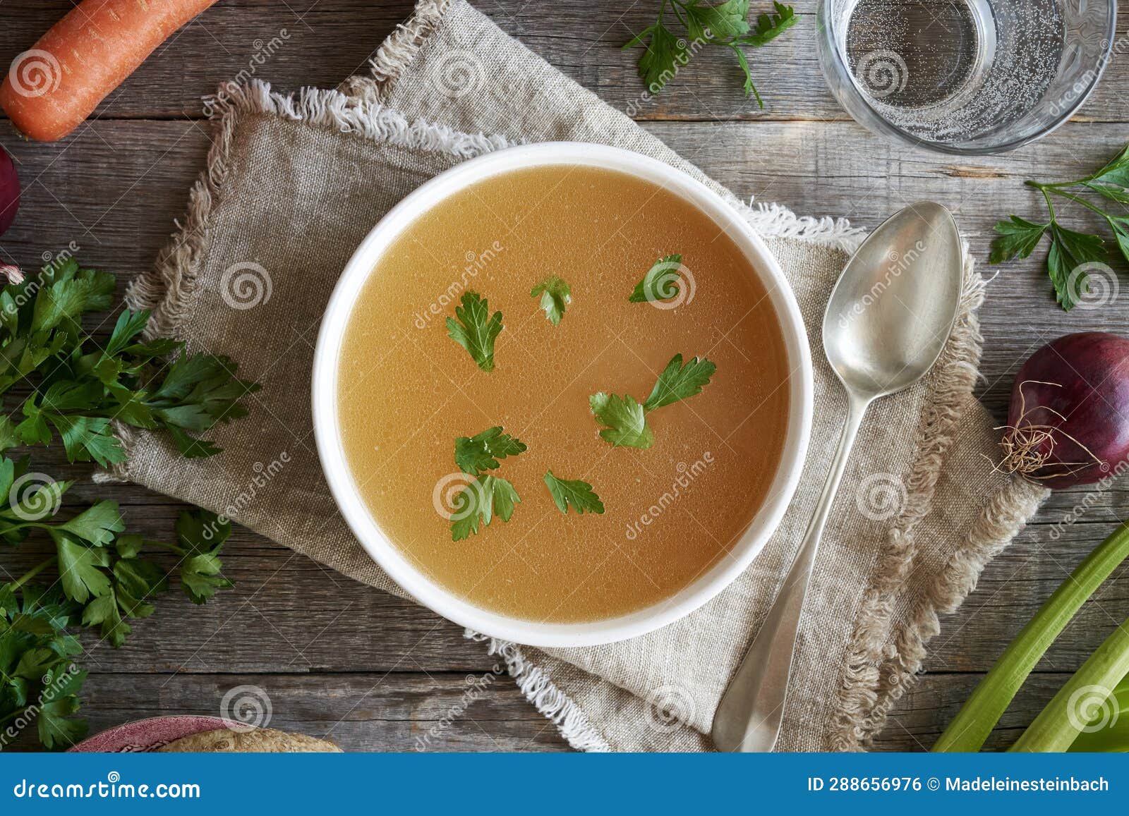 A Bowl of Chicken Bone Broth on a Table Stock Photo - Image of bowl ...