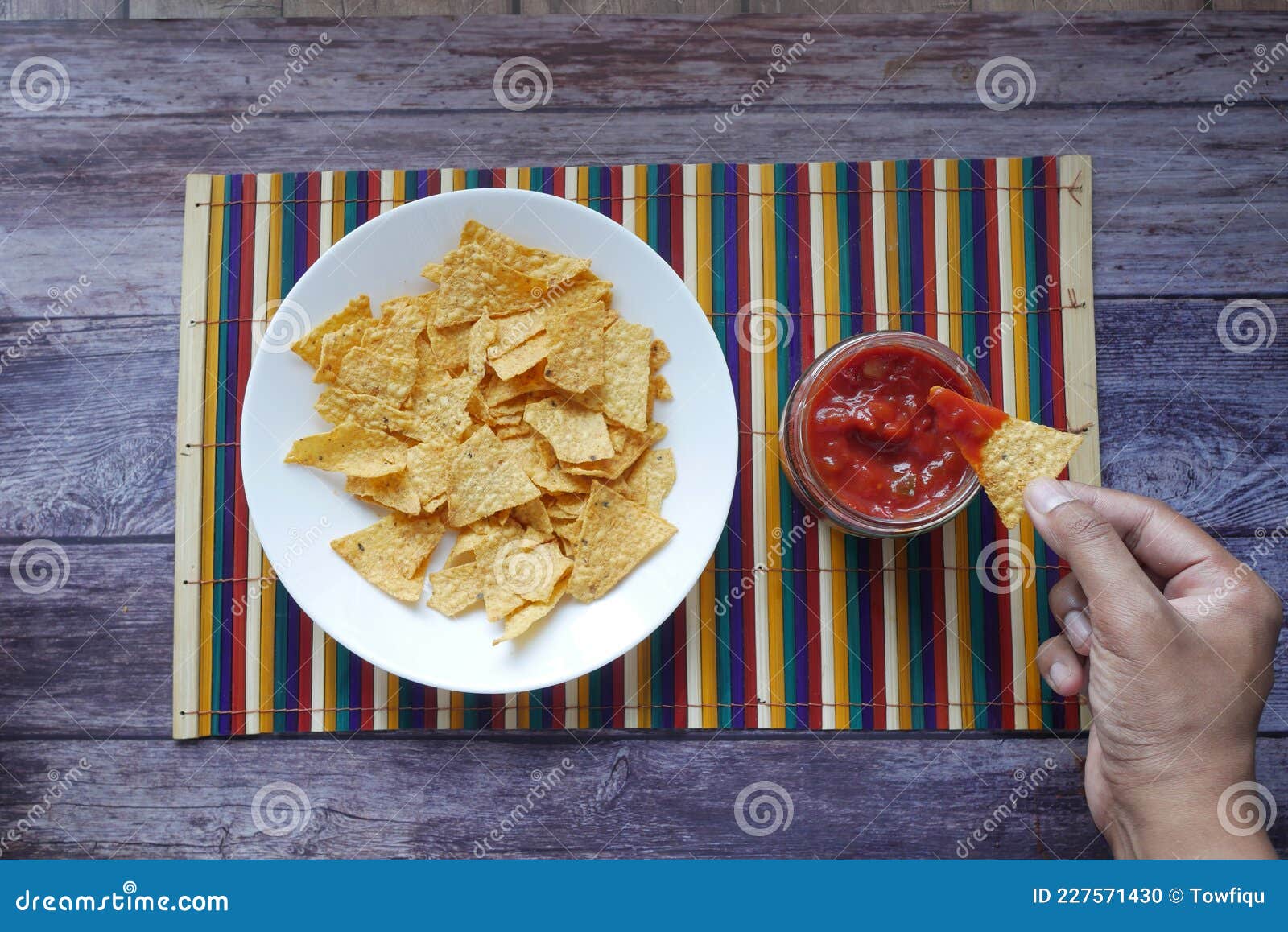 A Bowl of Chips and Salsa on Table , Stock Photo - Image of snack ...