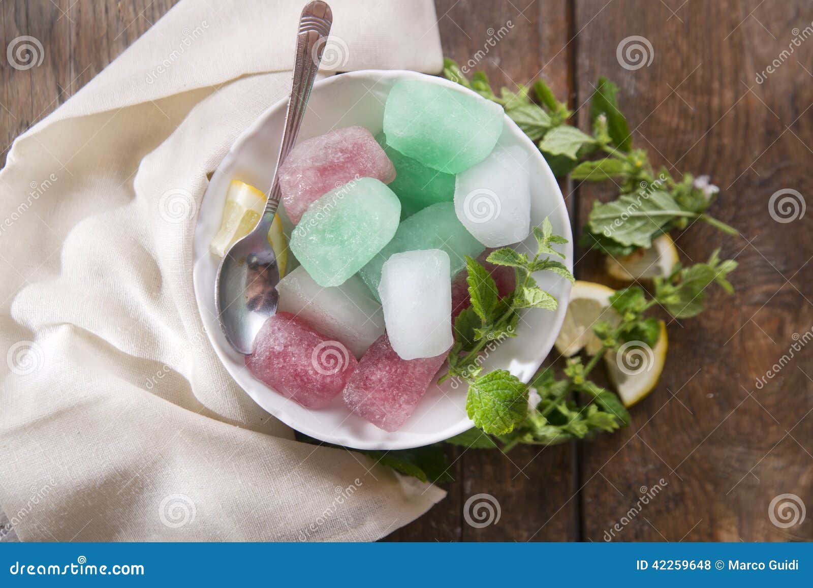 Bowl of colored ice-cubes stock photo. Image of refreshing - 42259648