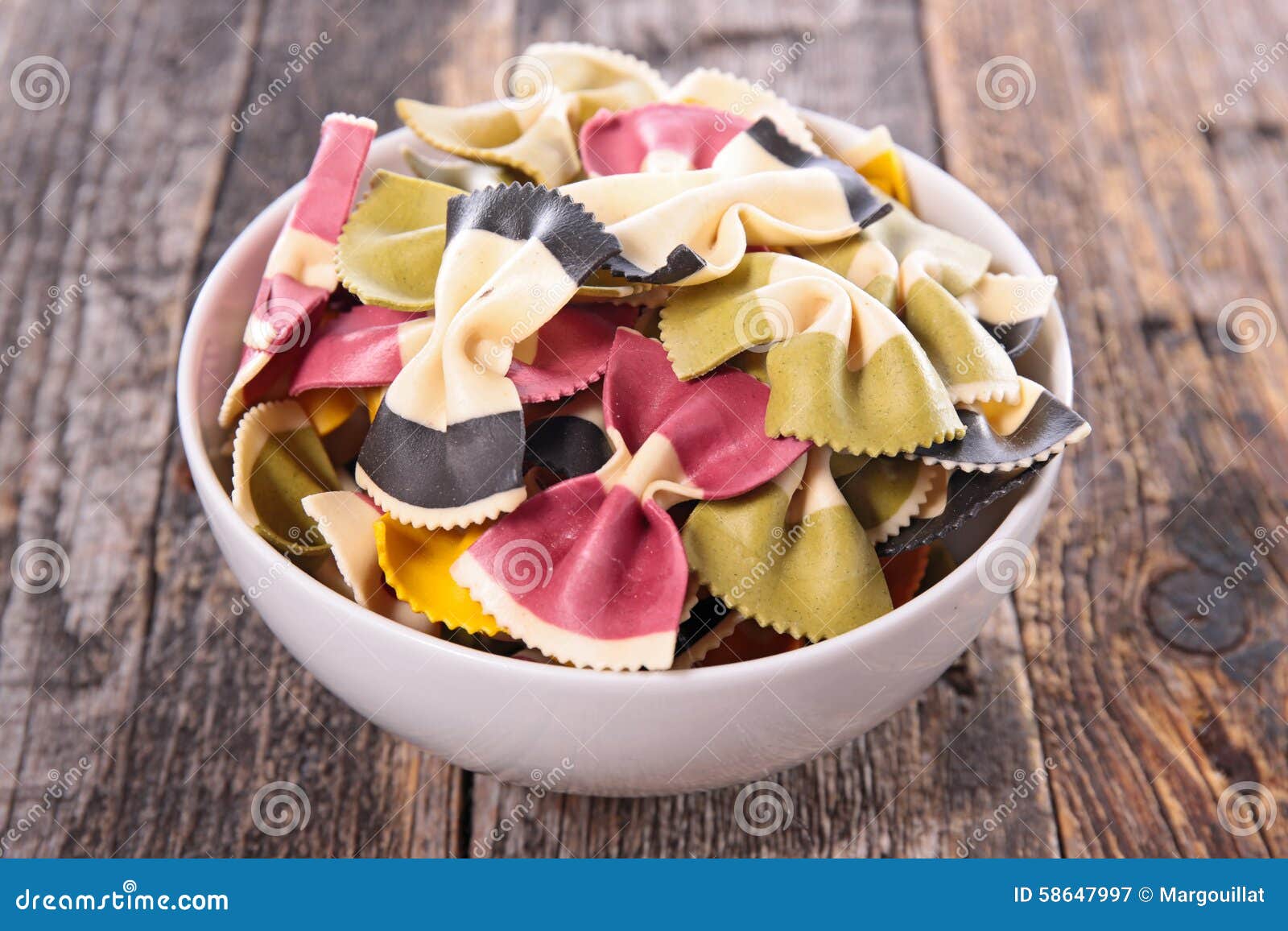 Bowl of colored pasta stock image. Image of diet, meal - 58647997