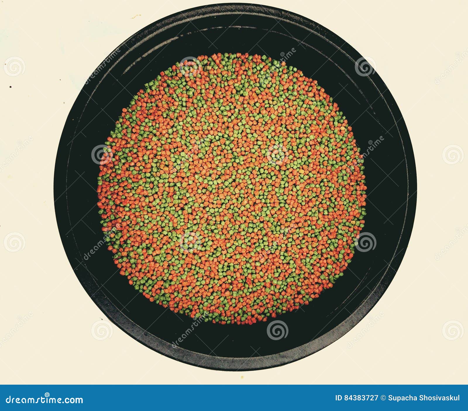 A Bowl of Colorful Fish Food Stock Image - Image of colorful, bowl ...